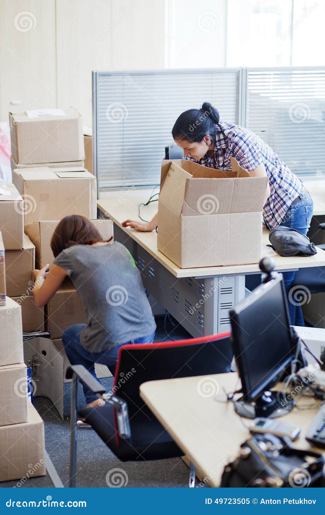 Two Girls Move into a New Office. Stock Image - Image of moving, office ...