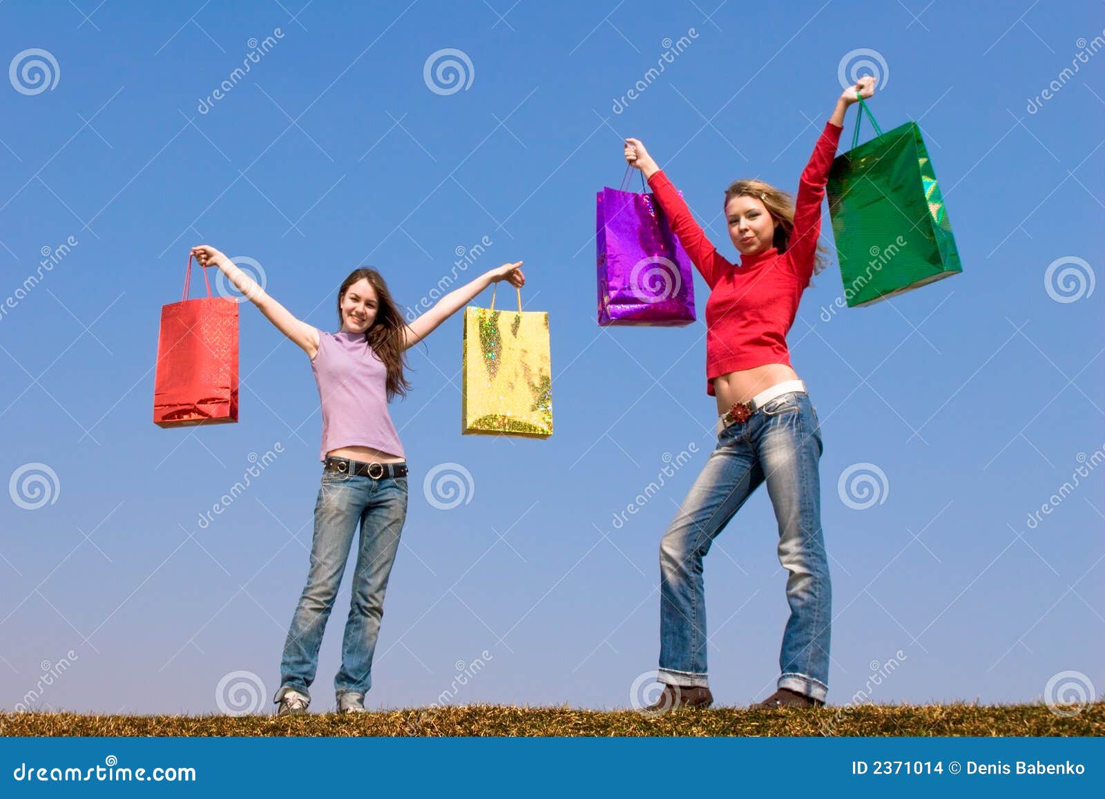 Two girls with packets stock photo. Image of laughing - 2371014