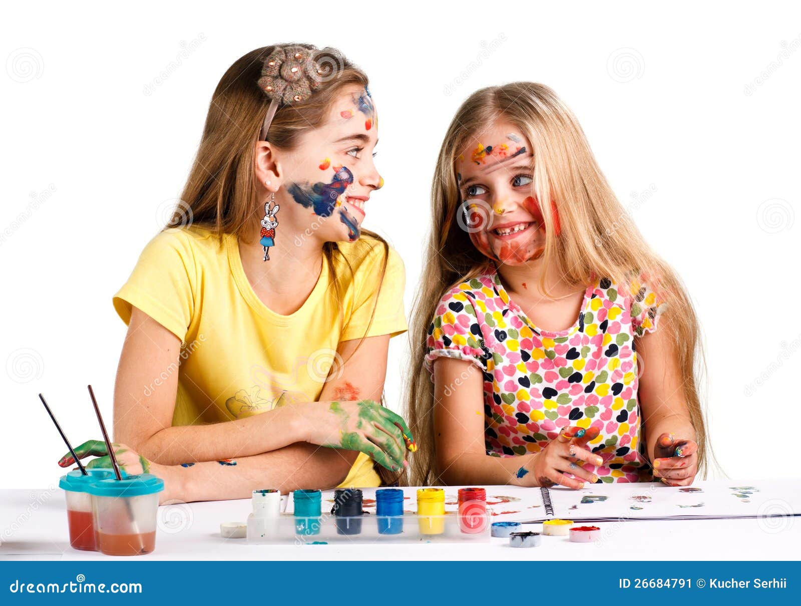 Two girls painted stock image. Image of domestic, lesson - 26684791