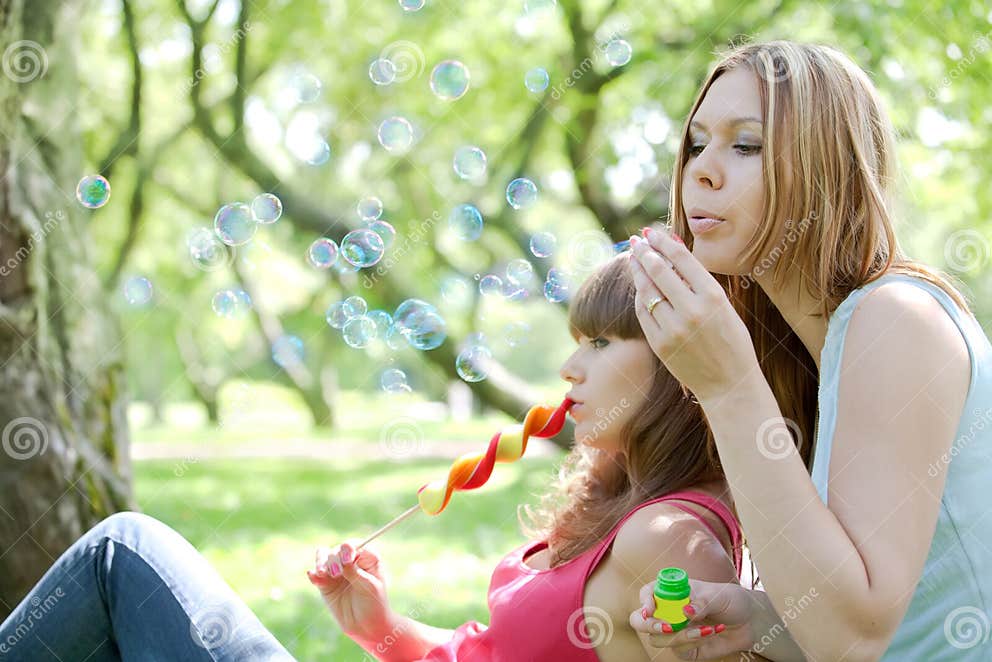 Two girls in the park stock image. Image of sisters, people - 11715781