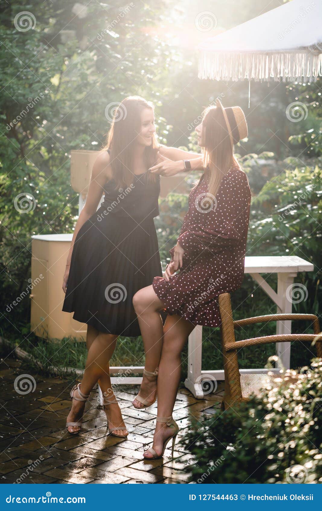 Two girls in the park stock image. Image of park, cute - 127544463