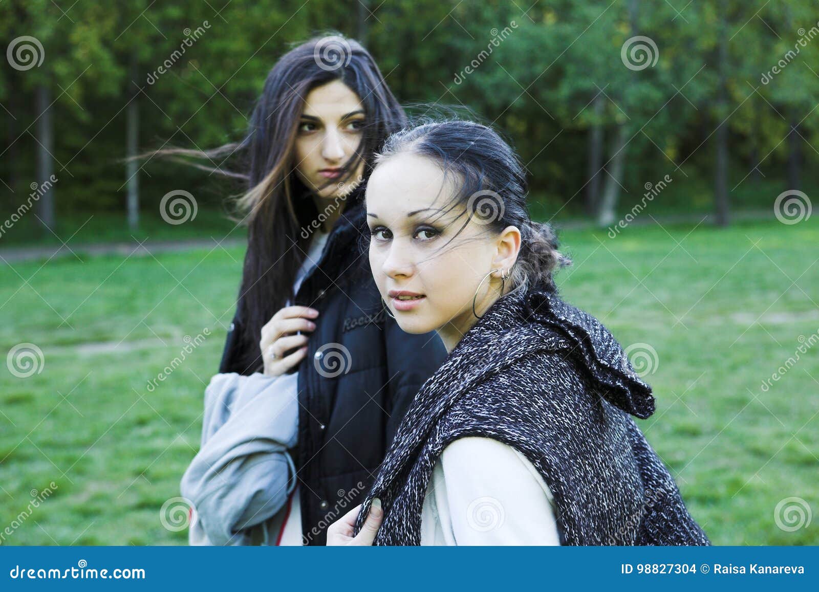 Two girls in park stock photo. Image of adult, happiness - 98827304