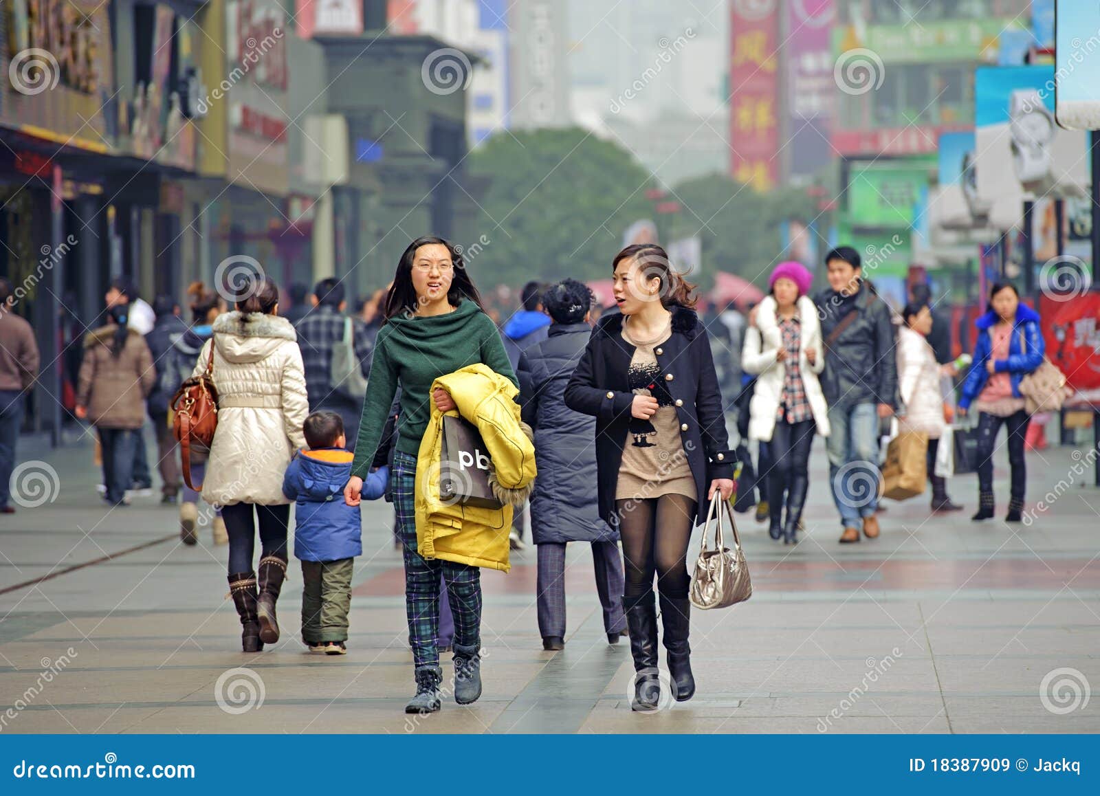 Two Girls Pass through a Busy Street Editorial Stock Image - Image of ...