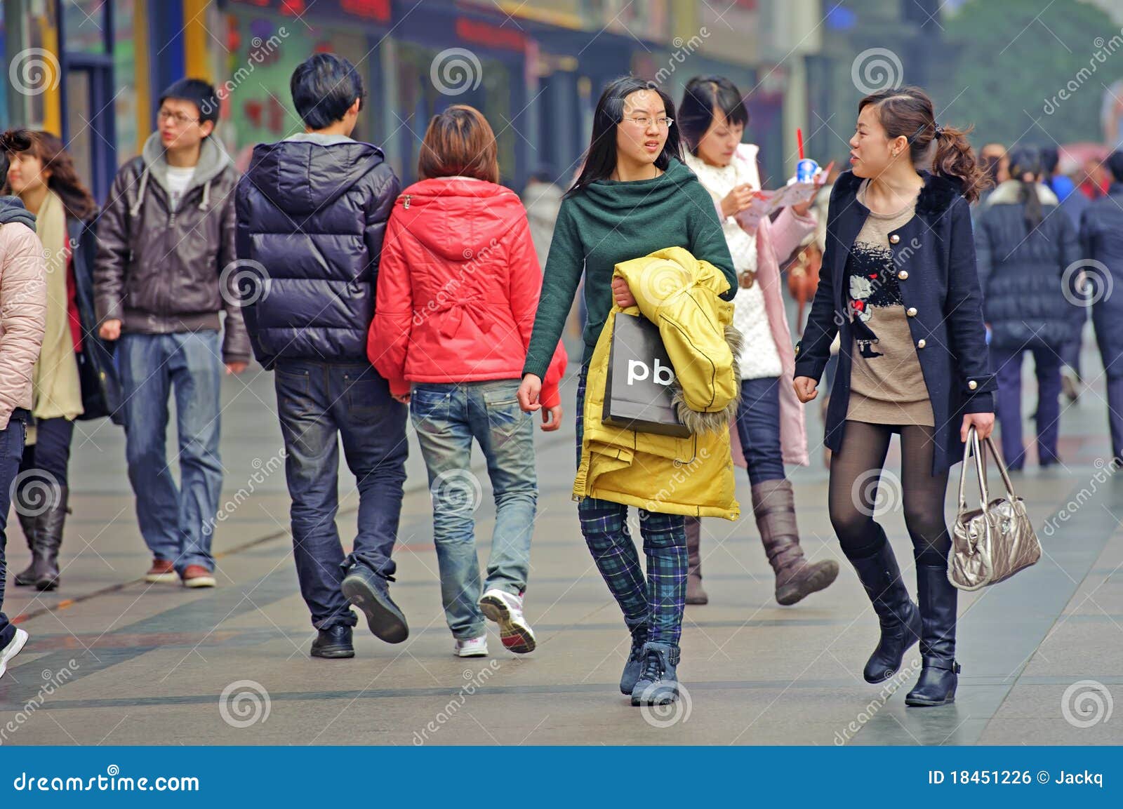 Two Girls Pass through a Busy Street Editorial Photo - Image of women ...