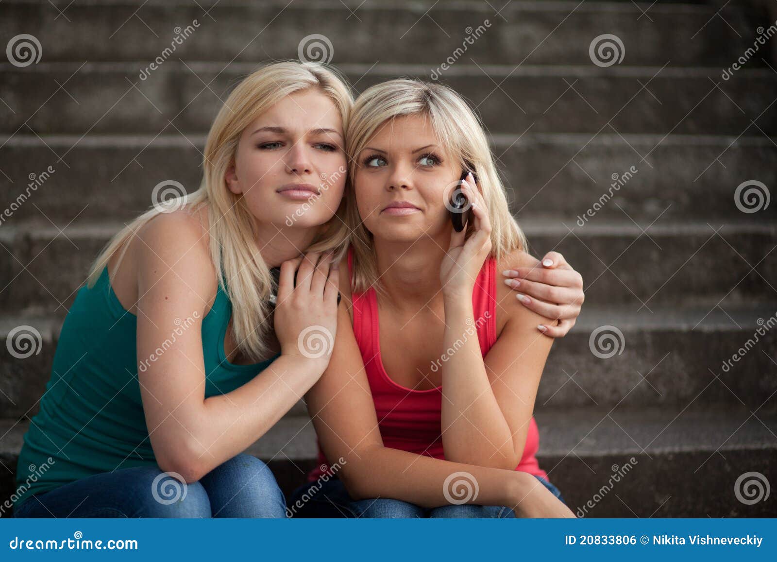 Two girls with the phones stock photo. Image of happy - 20833806