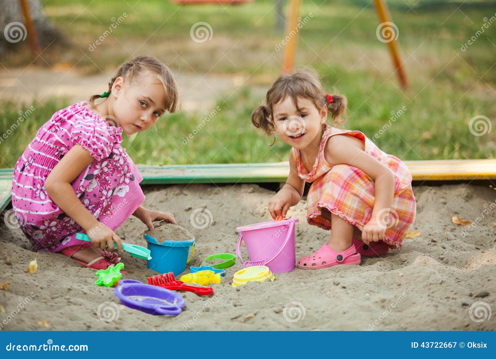 Two Girls Play in the Sandbox Stock Image - Image of kindergarten, face ...