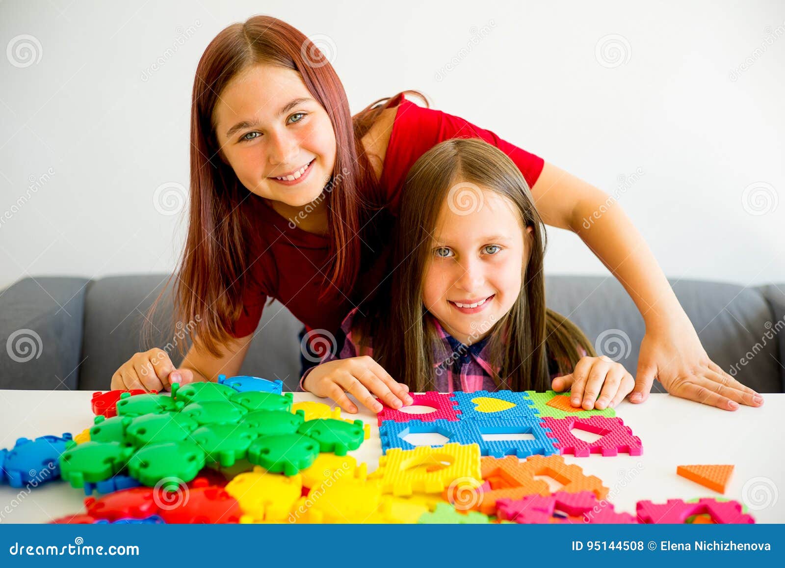 Two Girls Playing with Construction Blocks Stock Photo - Image of ...