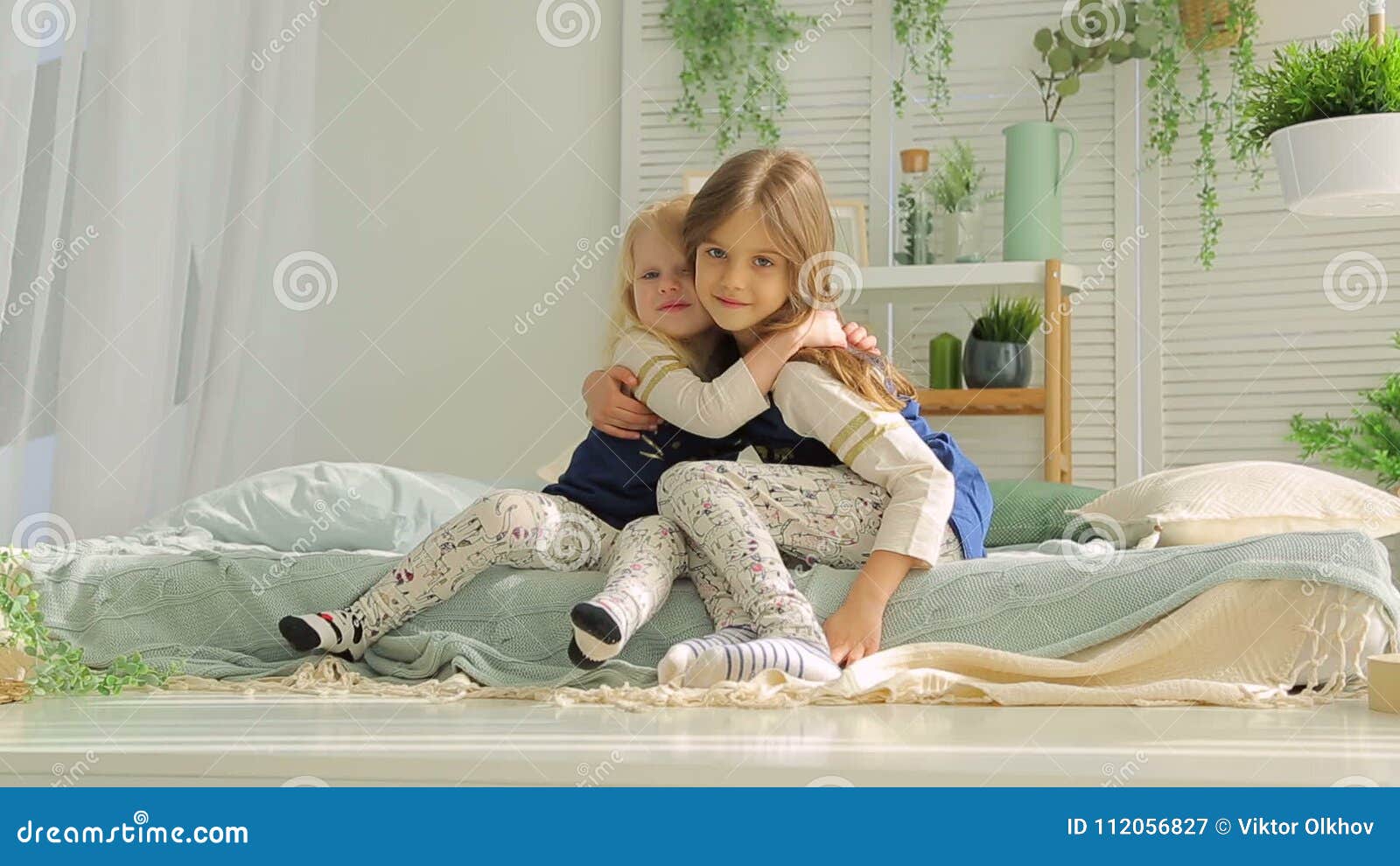 Two Girls Playing in the Room on the Bed and Hug Stock Video - Video of ...