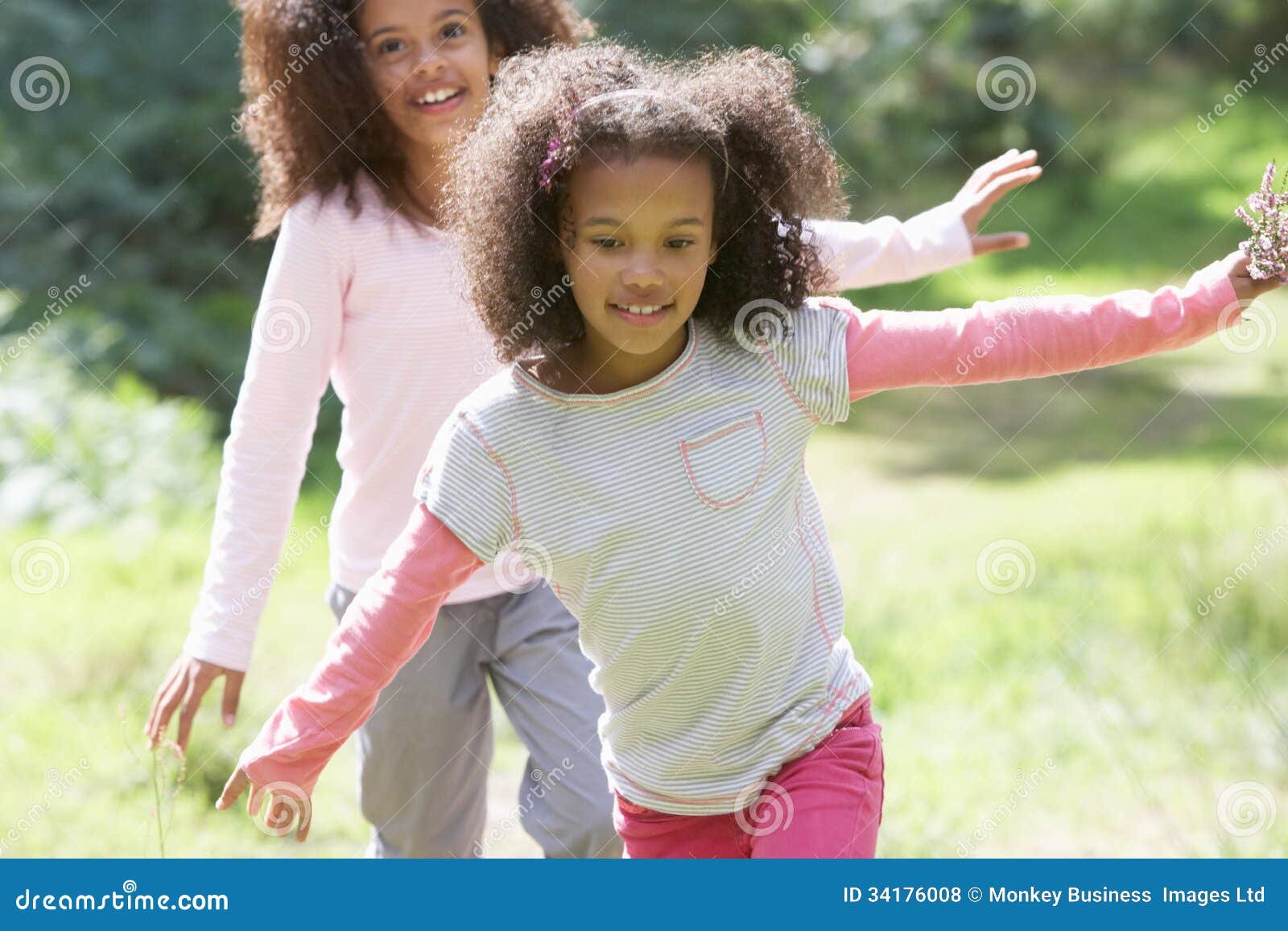 Two Girls Playing in Woods Together Stock Photo - Image of active ...