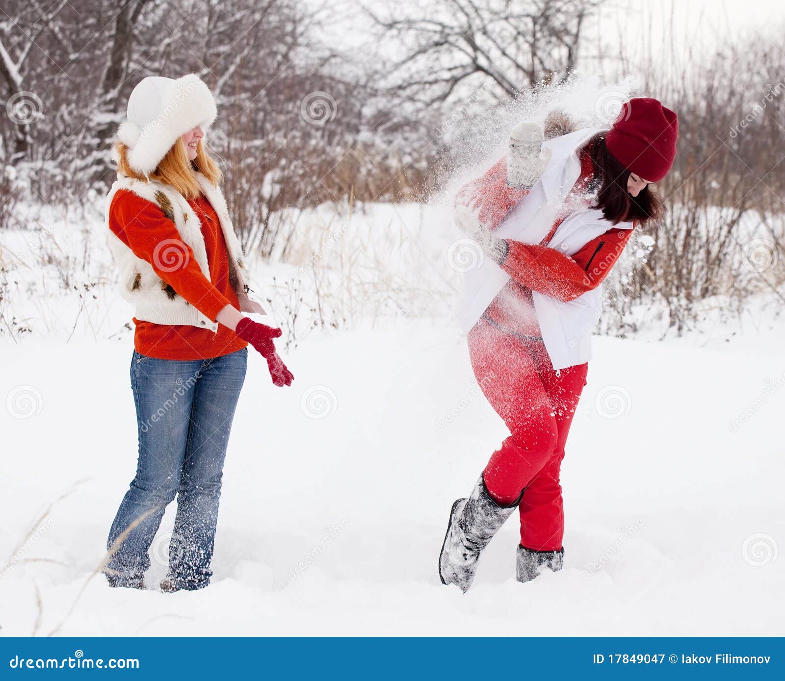 Two girls plays with snow stock image. Image of celebrating - 17849047