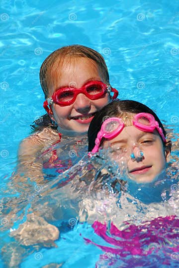 Two girls pool stock image. Image of active, happiness - 979147