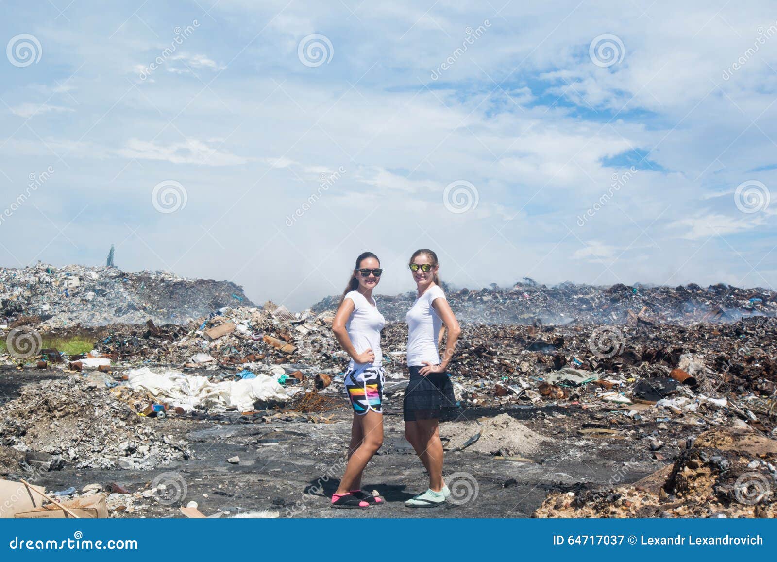 Two Girls Posing in Front of Garbage Dump Stock Image - Image of ...