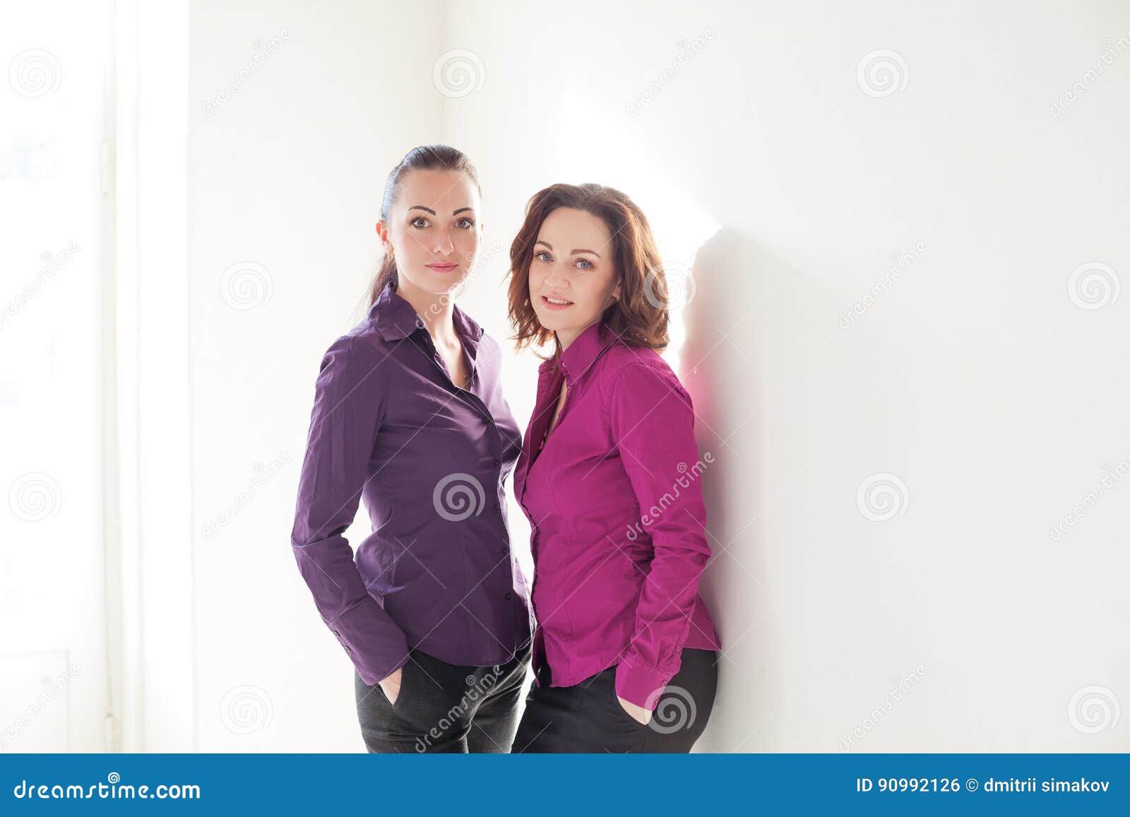 Two Girls in Purple are the Walls Stock Photo - Image of elegance ...