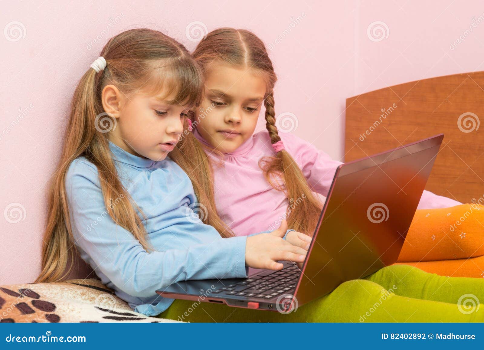 Two Girls Pushing A Haystack Royalty-Free Stock Photography ...