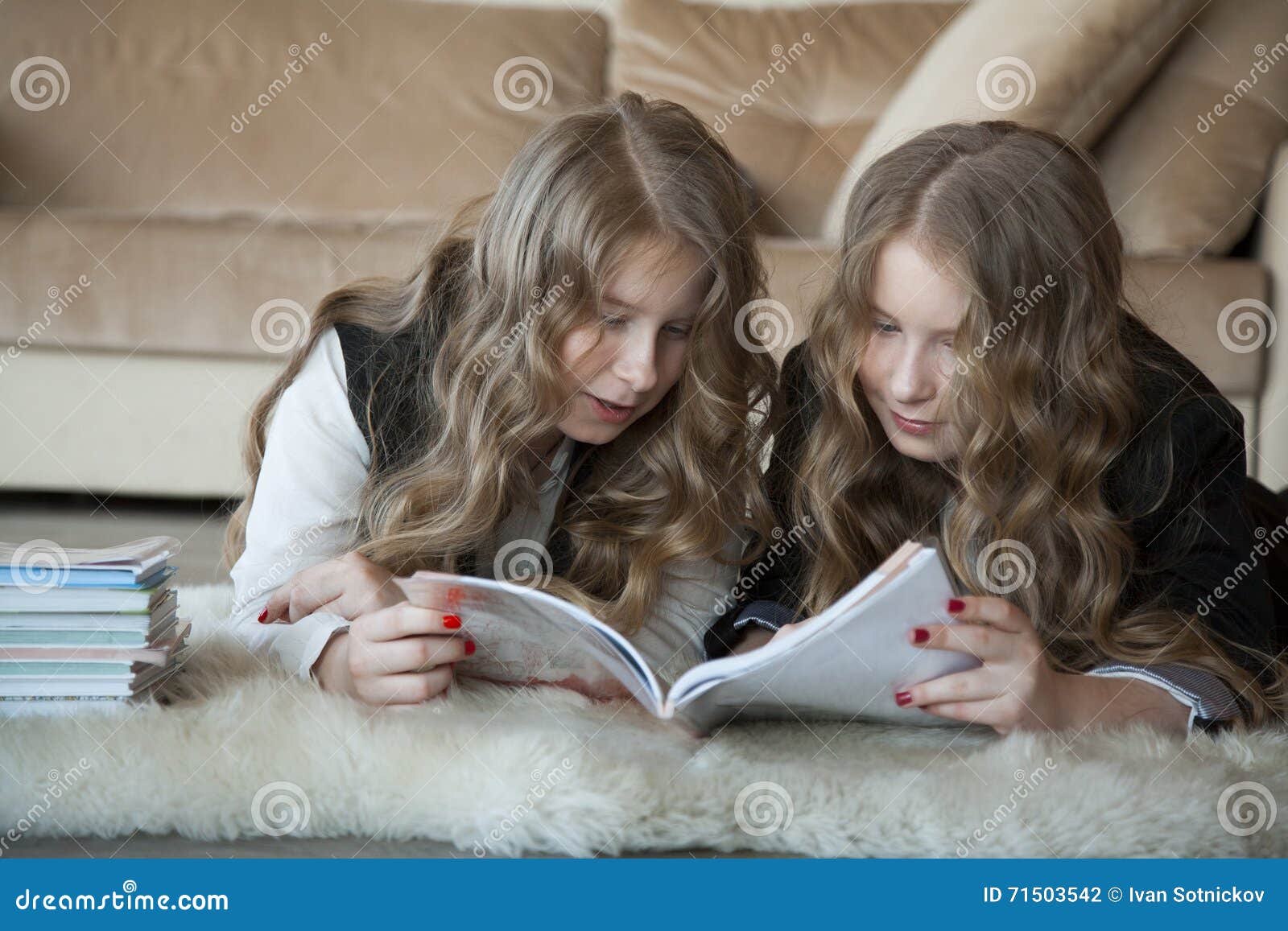 Two girls reading stock photo. Image of watch, blue, reading - 71503542
