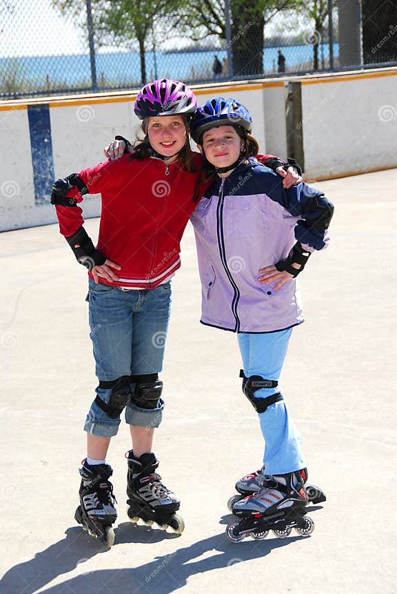 Two girls rollerblading stock image. Image of playing, safe - 803479