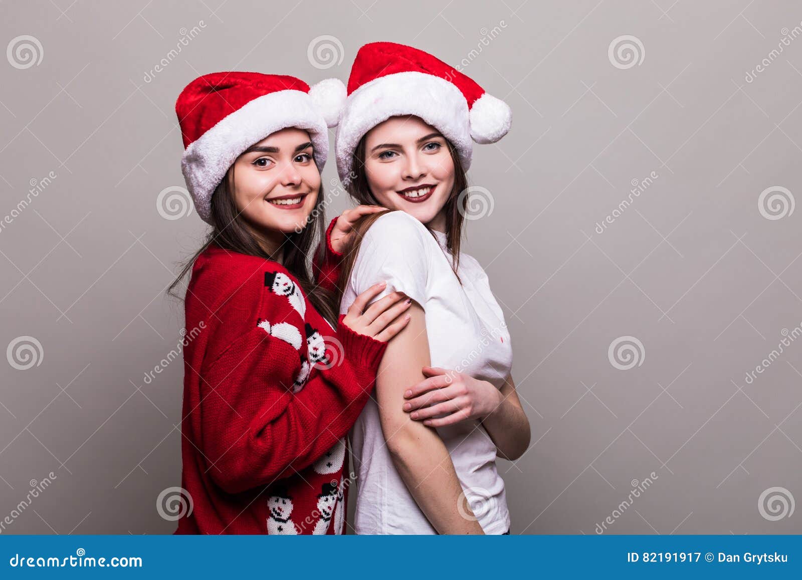 Two girls in Santa hat stock image. Image of caucasian - 82191917