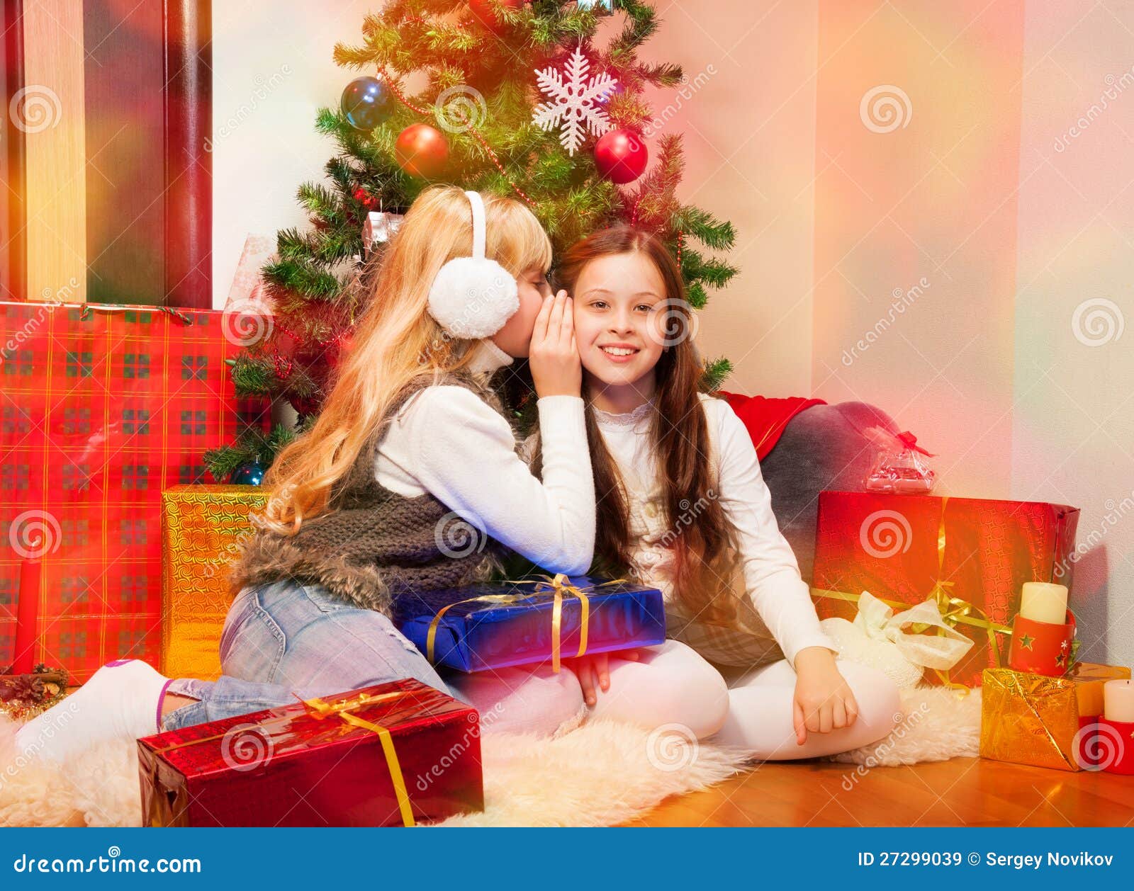 Two girls sharing secrets stock image. Image of decorations - 27299039