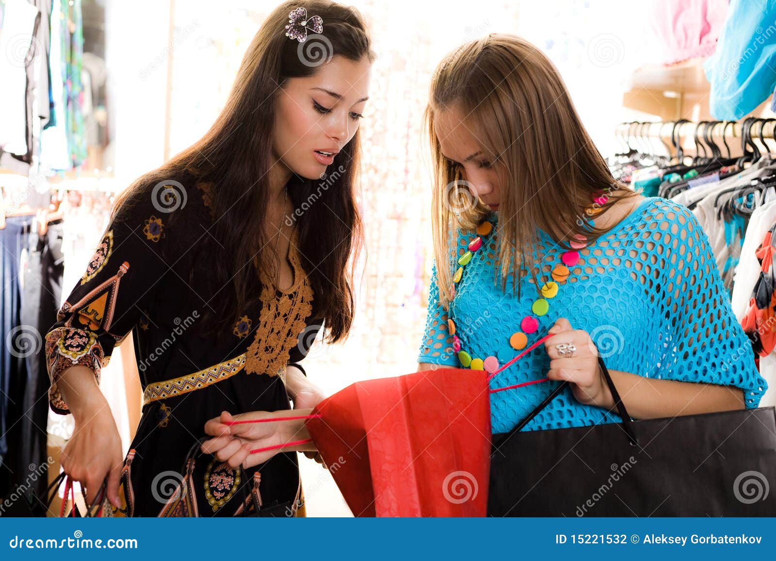 Two girls are shopping stock photo. Image of blue, buying - 15221532