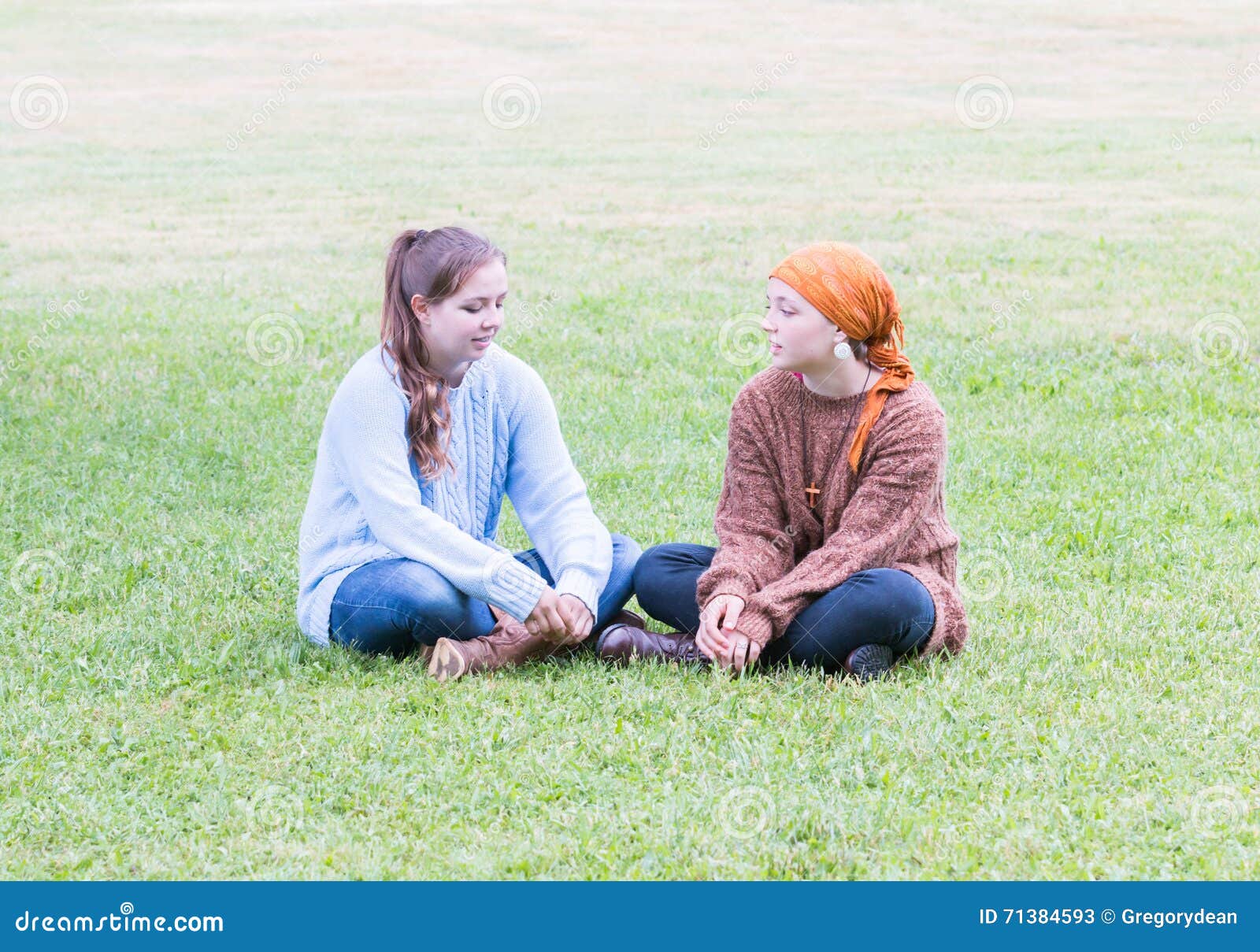 Two Girls Sitting on Grass stock image. Image of happy - 71384593