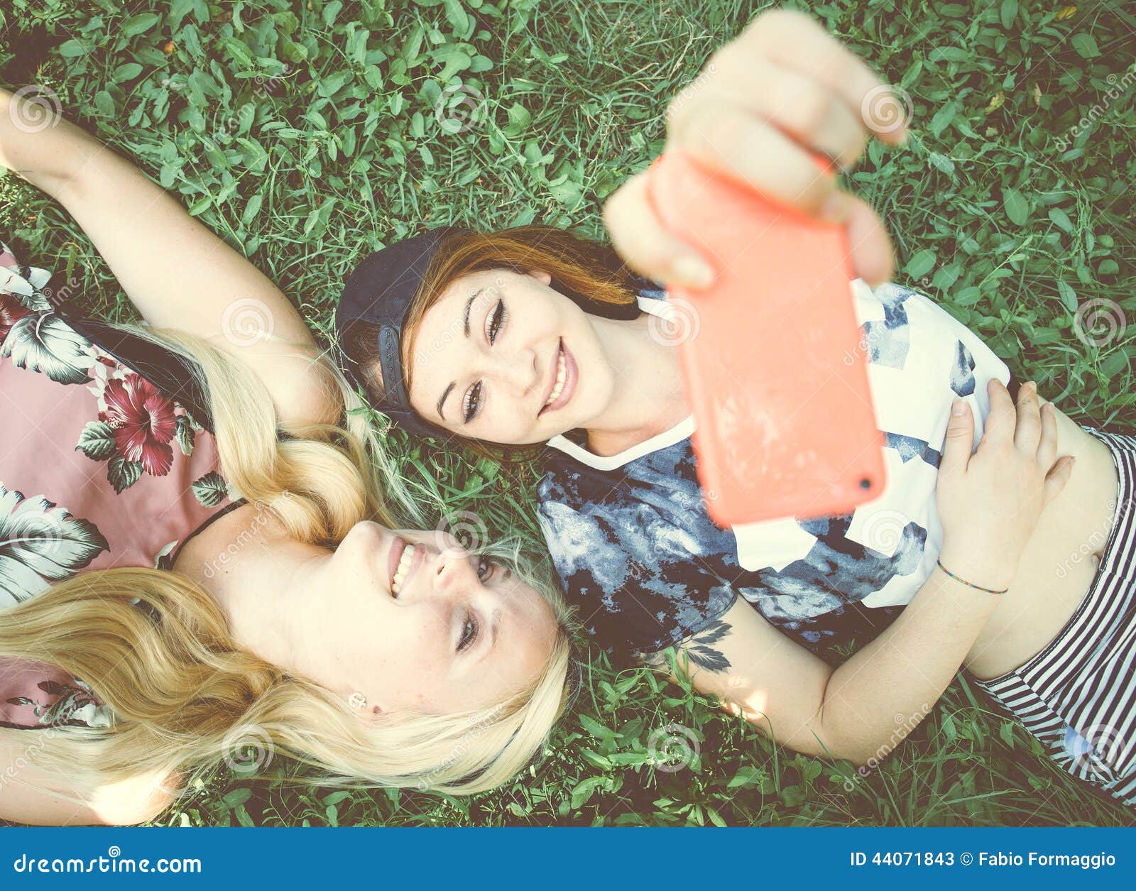 Two Girls Smiling at Camera Stock Image - Image of girl, selfshot: 44071843