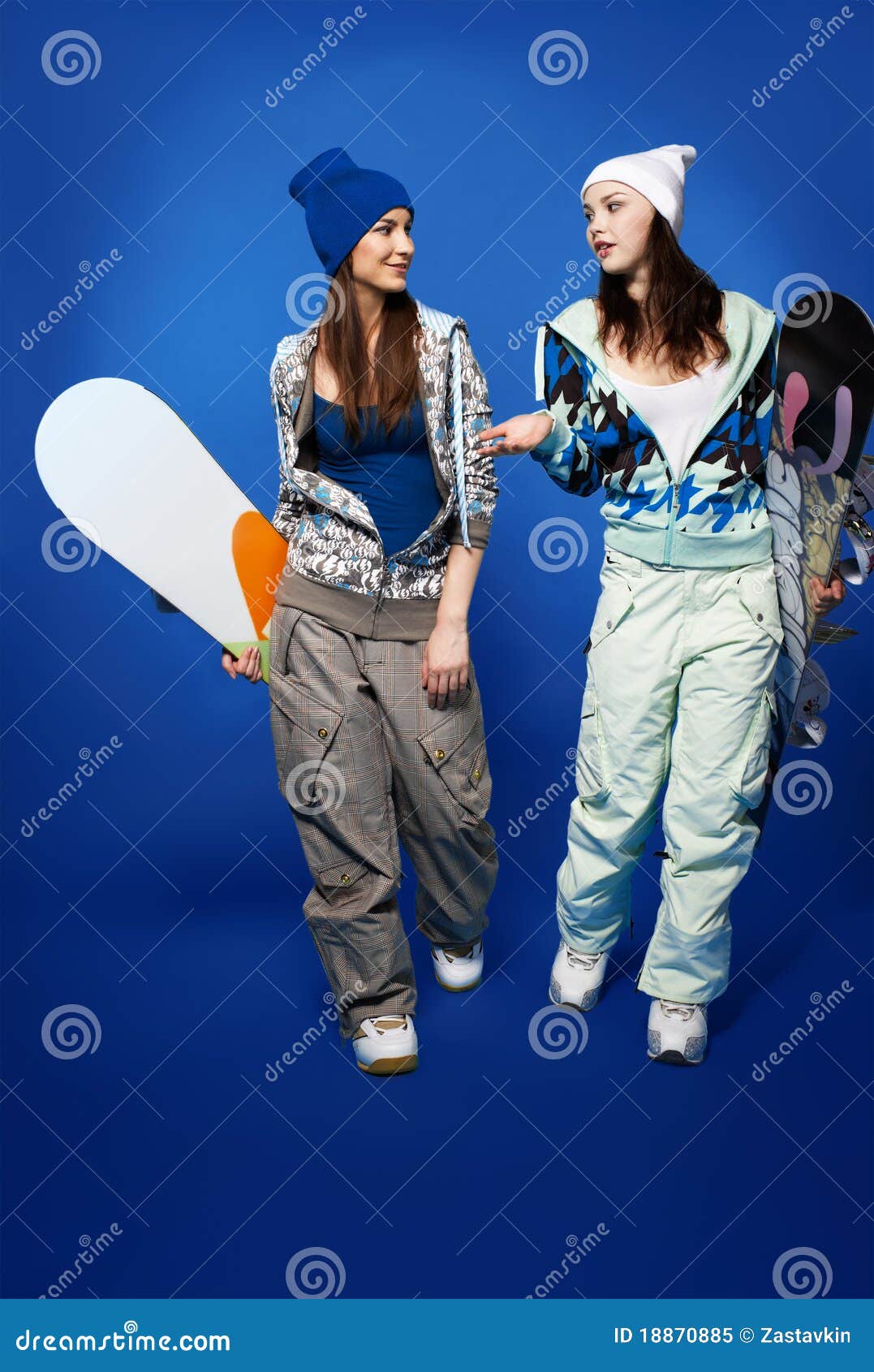 Two girls with snowboards stock image. Image of hobby - 18870885