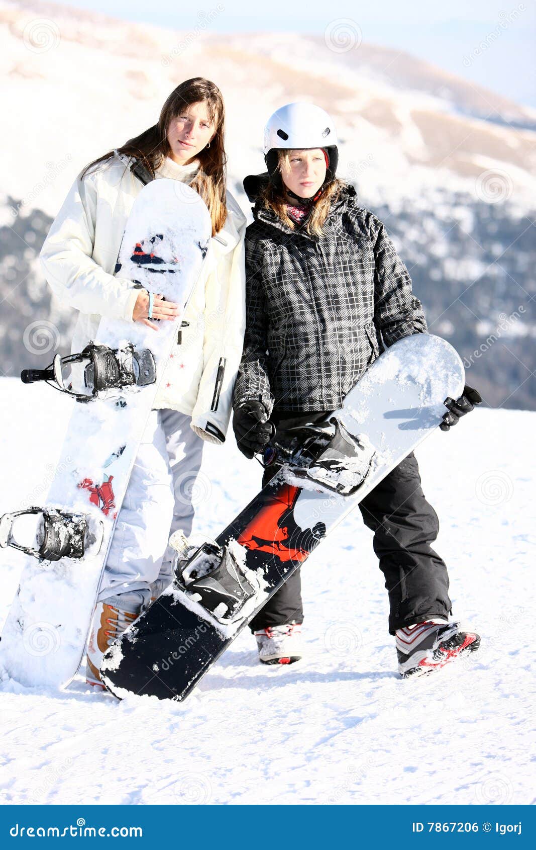 Two girls with snowboards stock photo. Image of jump, skier - 7867206