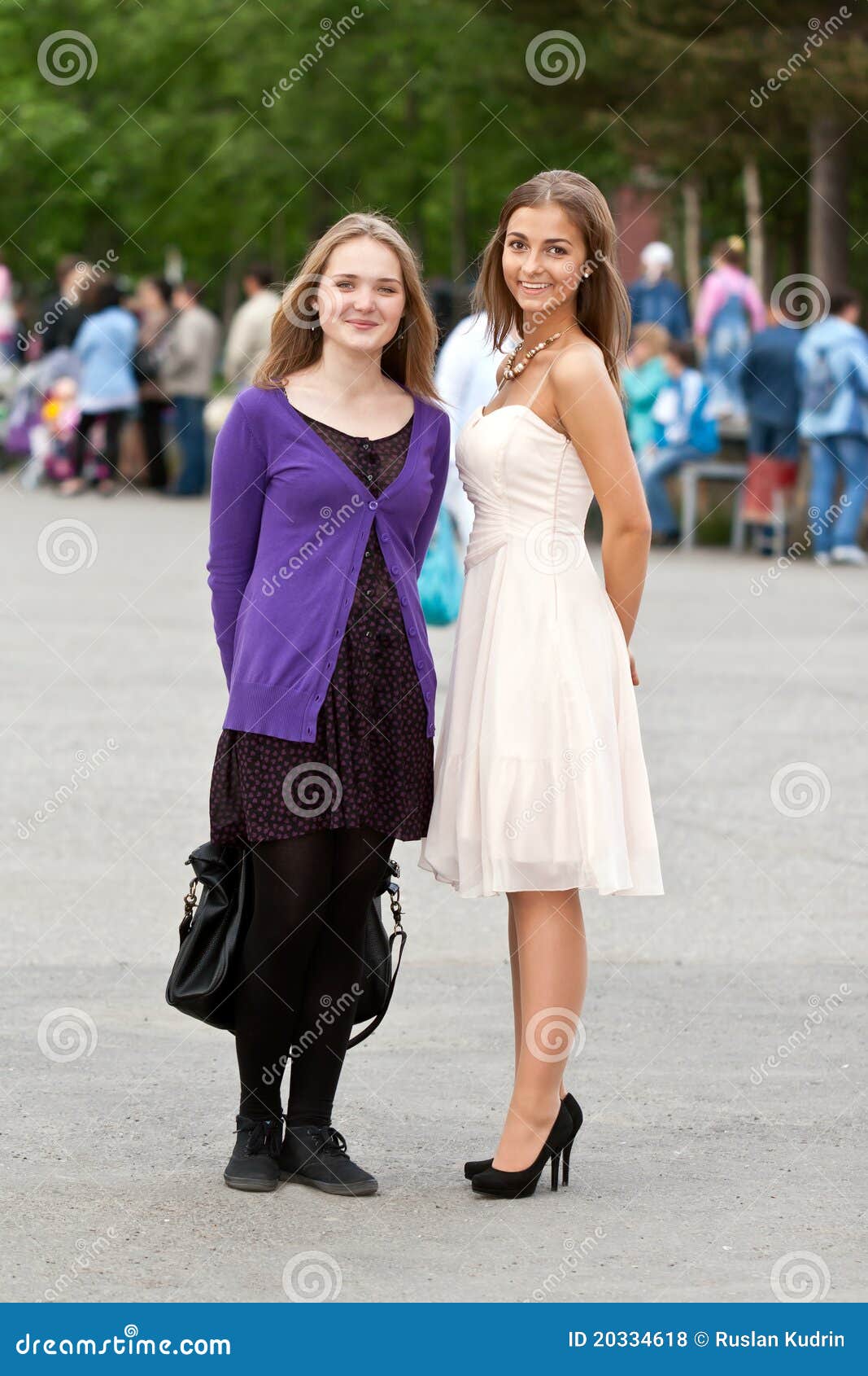 Two girls in a square stock photo. Image of young, outdoors - 20334618