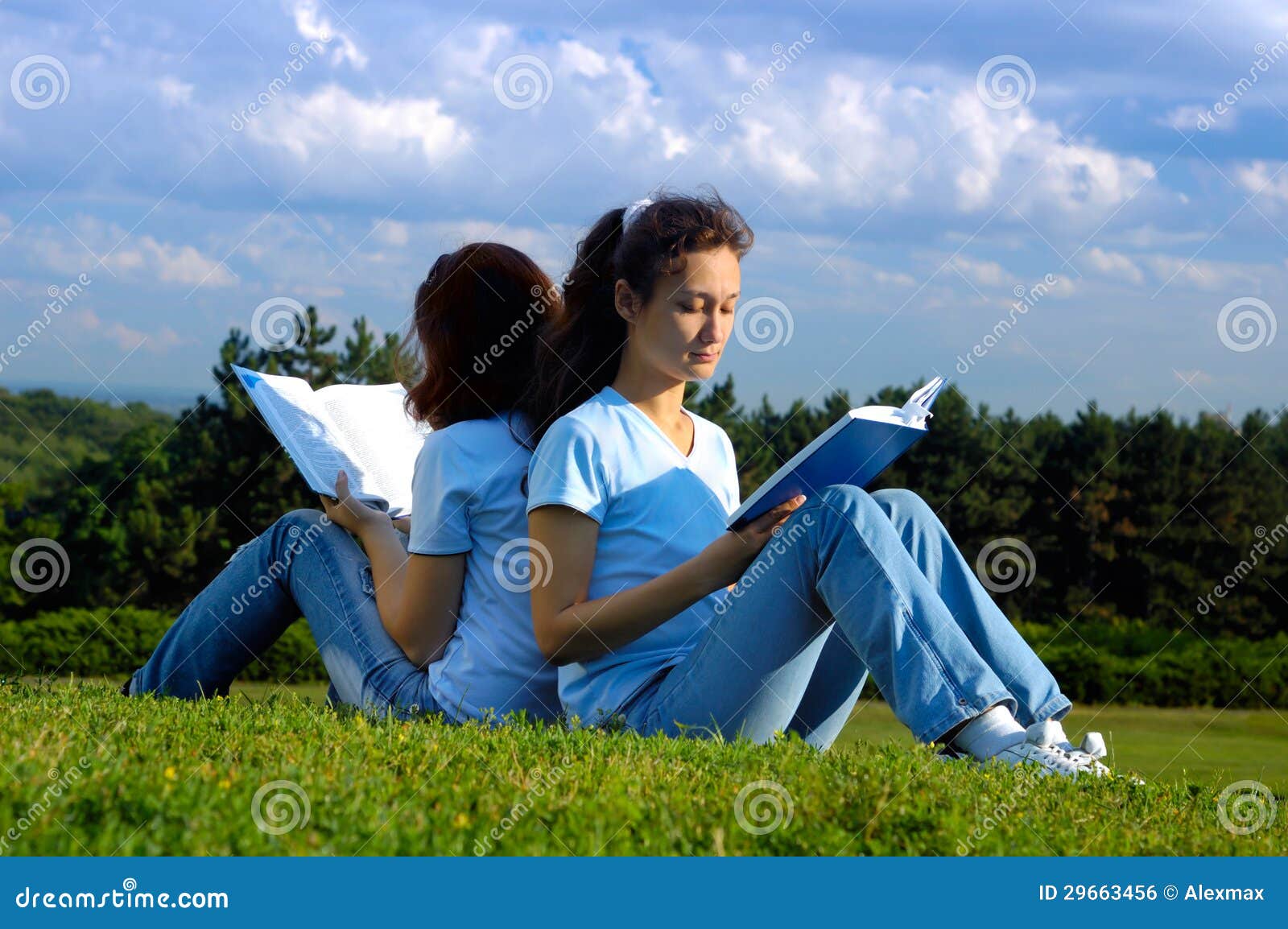Two Girls Students Studying Reading Outdoors Stock Photo - Image of ...
