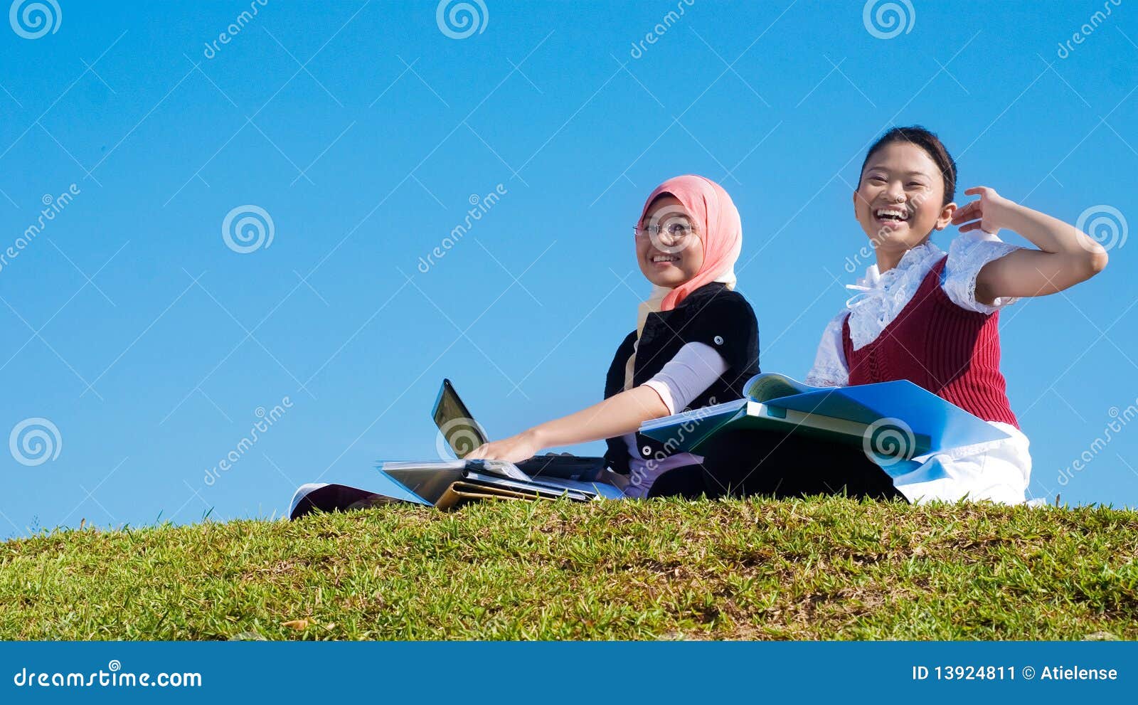 Two girls study happily stock image. Image of education - 13924811