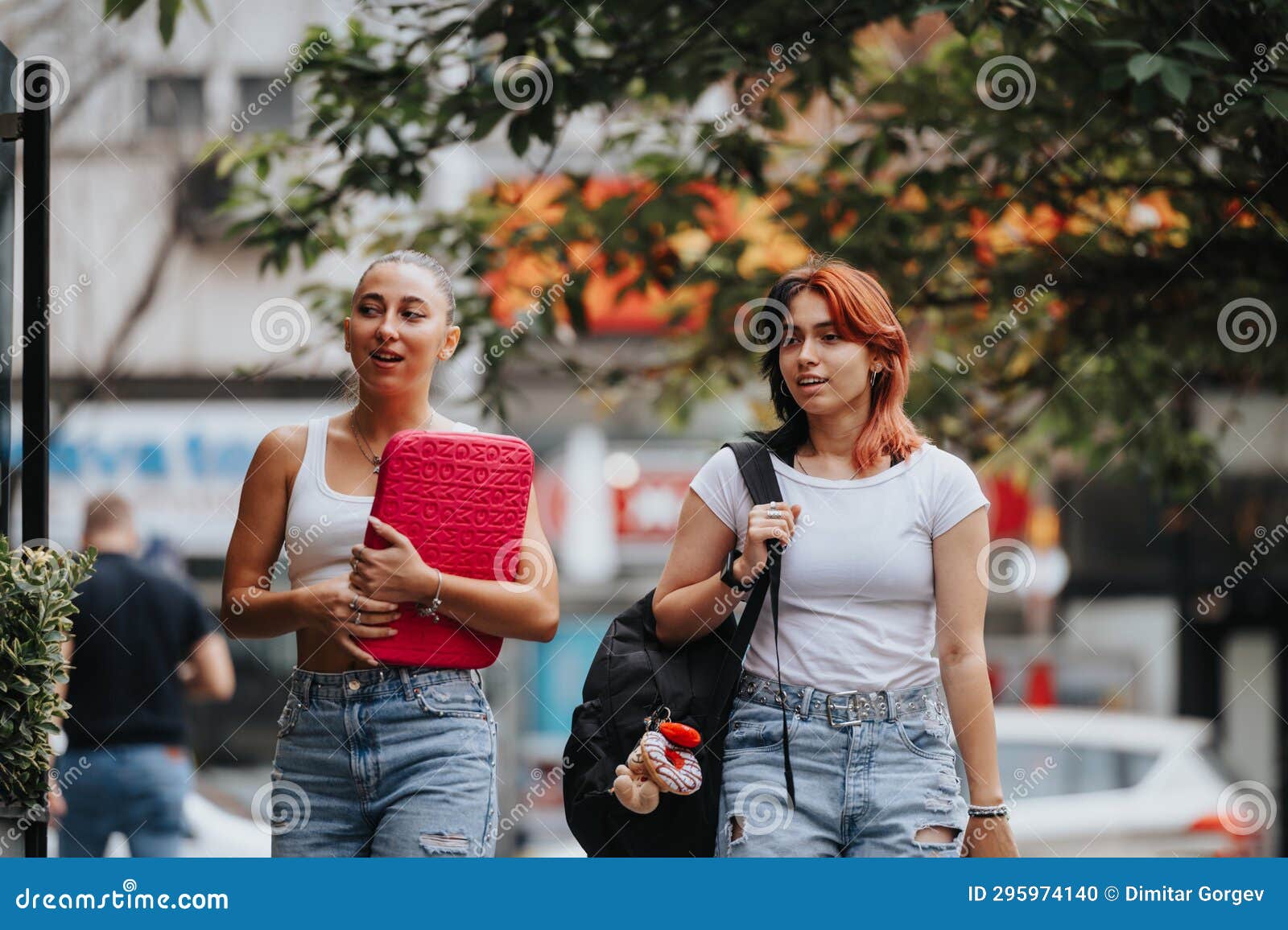 Two Girls Studying Together and Enjoying E-Learning Outdoors Stock ...