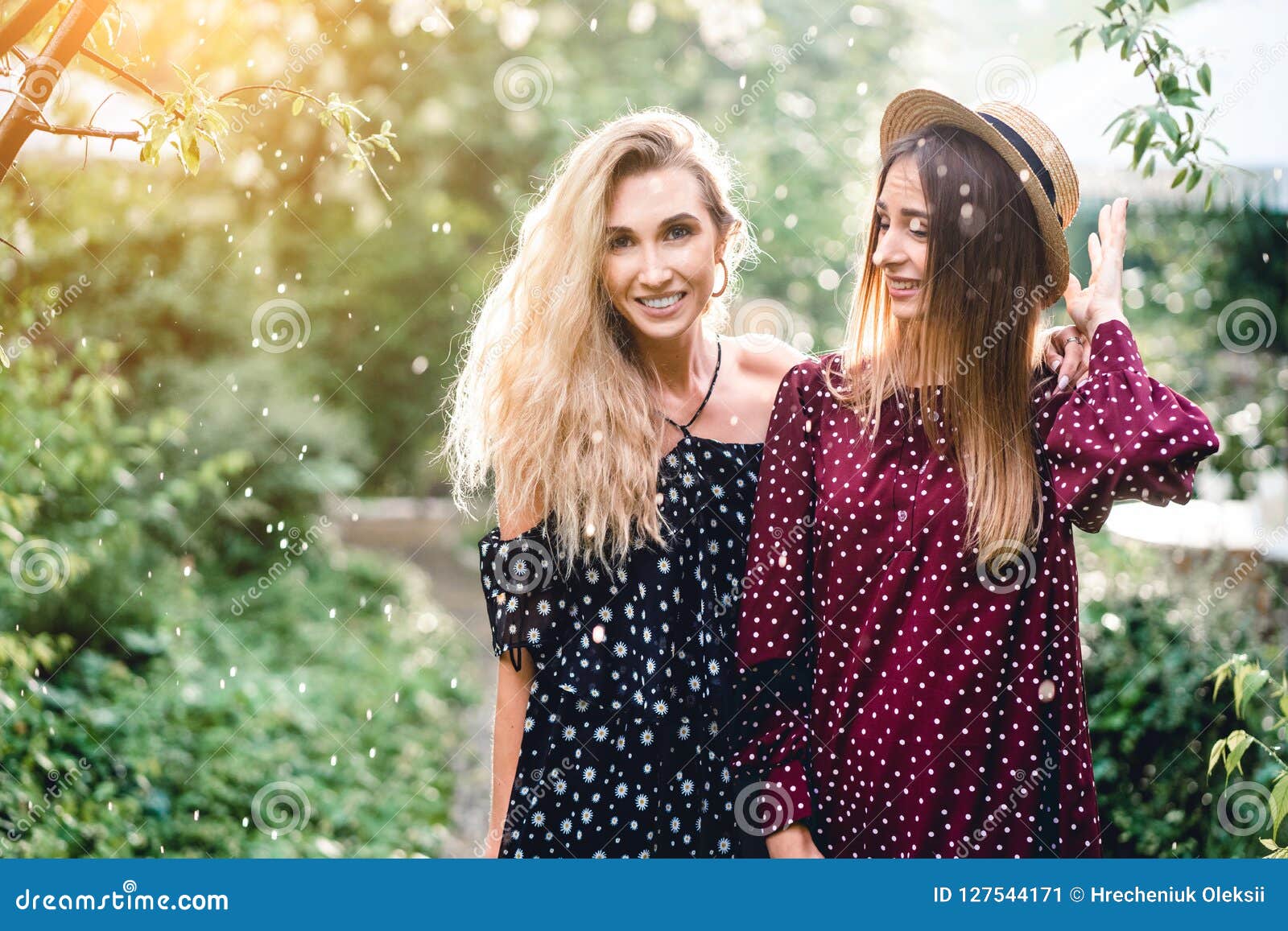 Two girls in a summer park stock image. Image of beauty - 127544171