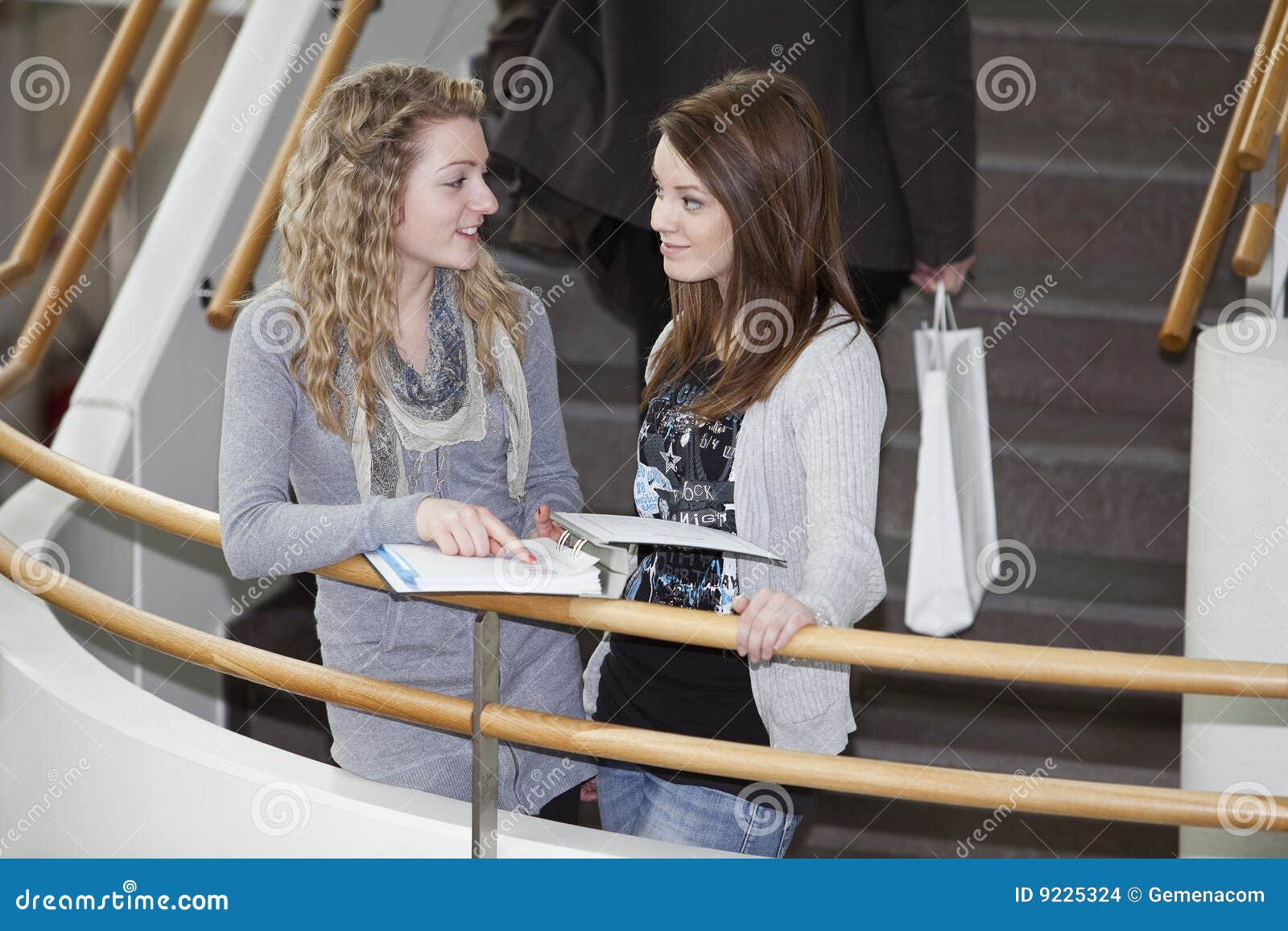 Two girls talking stock photo. Image of happy, work, school - 9225324