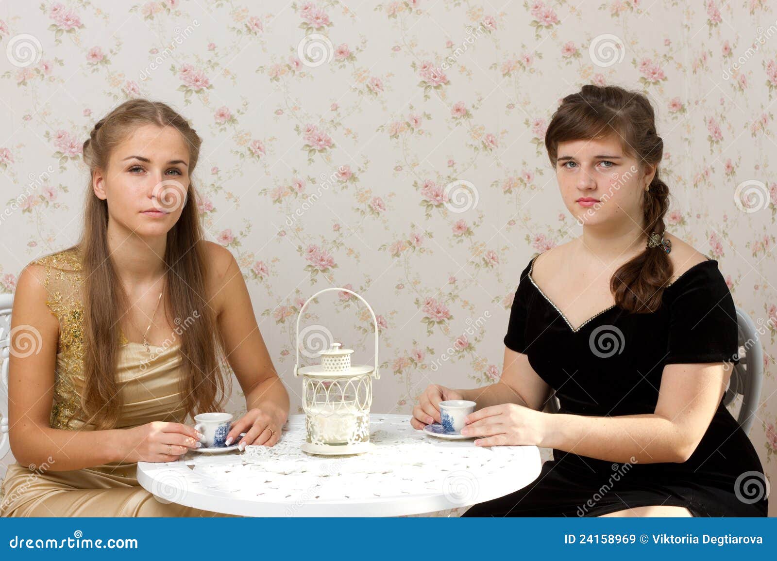 Two Girls Talking at a Table in a Cafe Stock Image - Image of beautiful ...