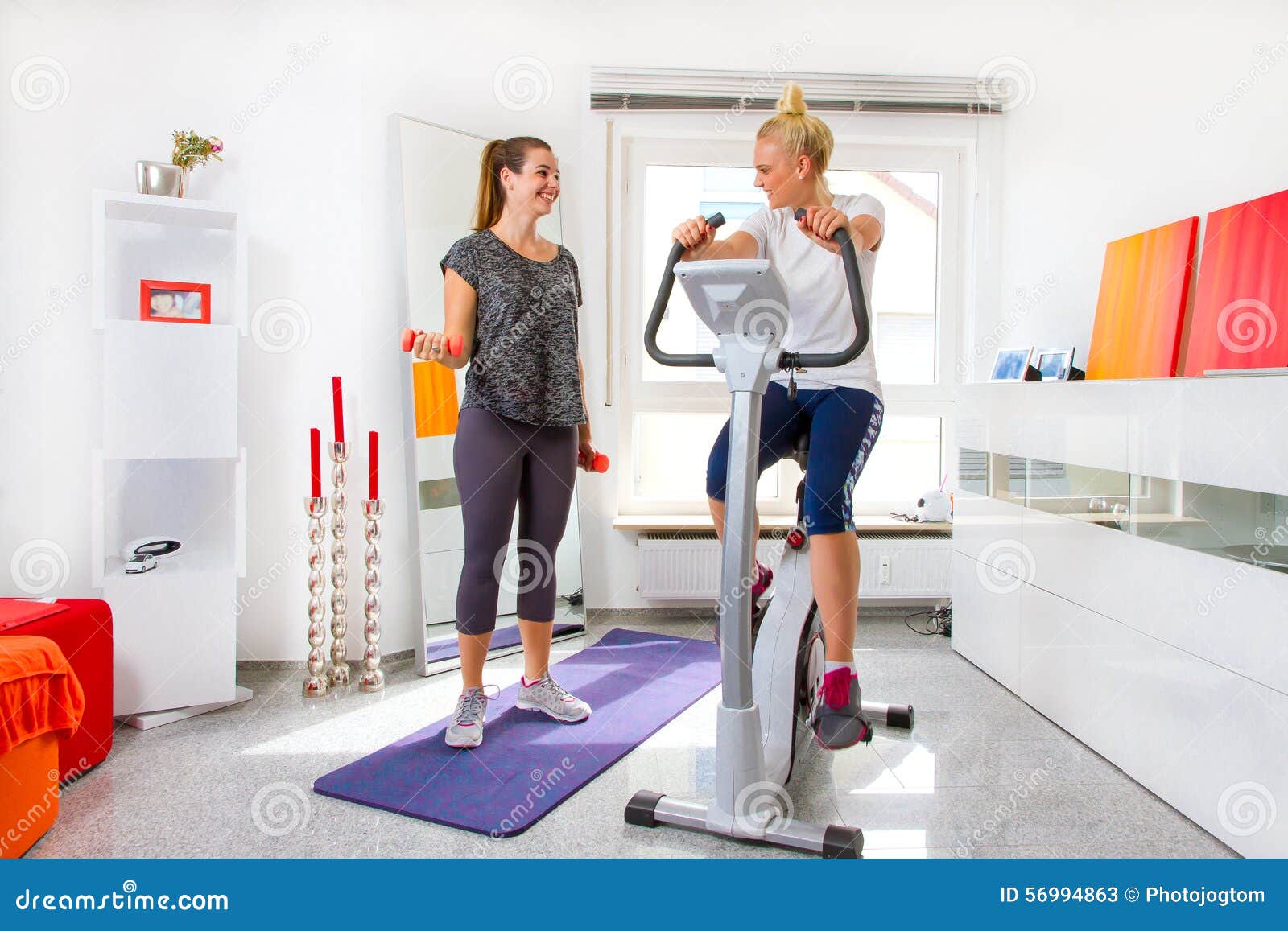Two girls training at home stock image. Image of figure - 56994863