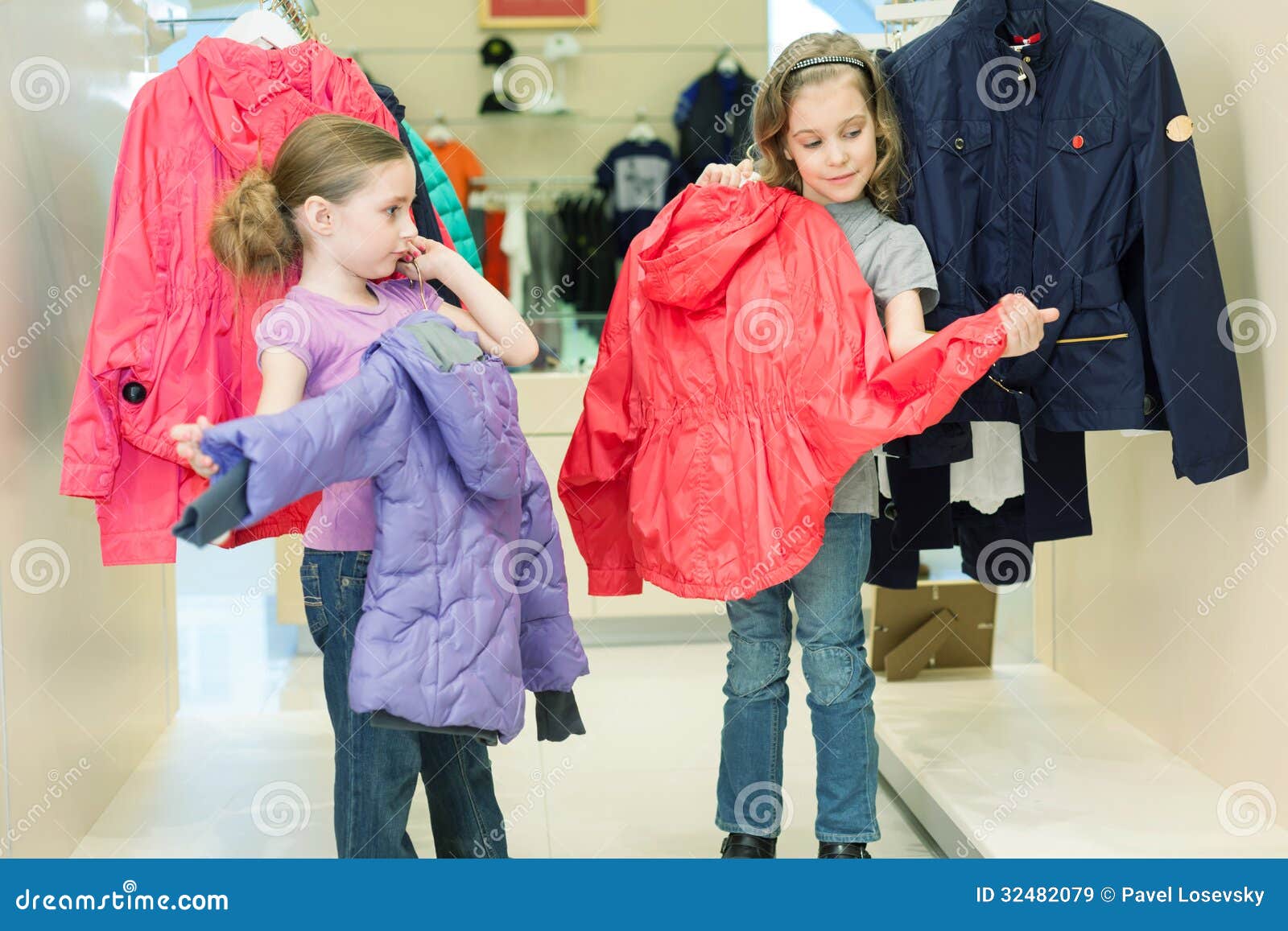 Two Girls Try on Clothes in a Store Stock Image - Image of female ...