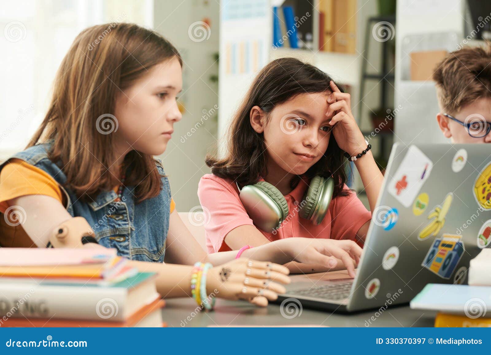 Two Girls Using Computer in Library Stock Image - Image of device ...