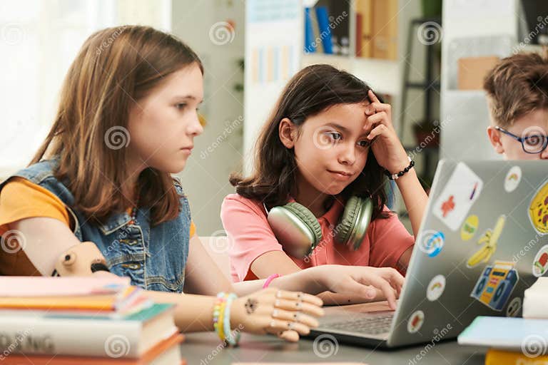 Two Girls Using Computer in Library Stock Image - Image of device ...