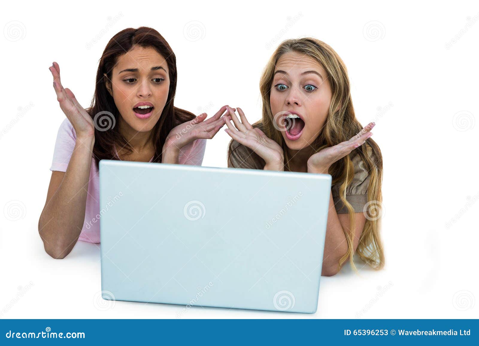 Two girls using a laptop stock image. Image of attractive - 65396253