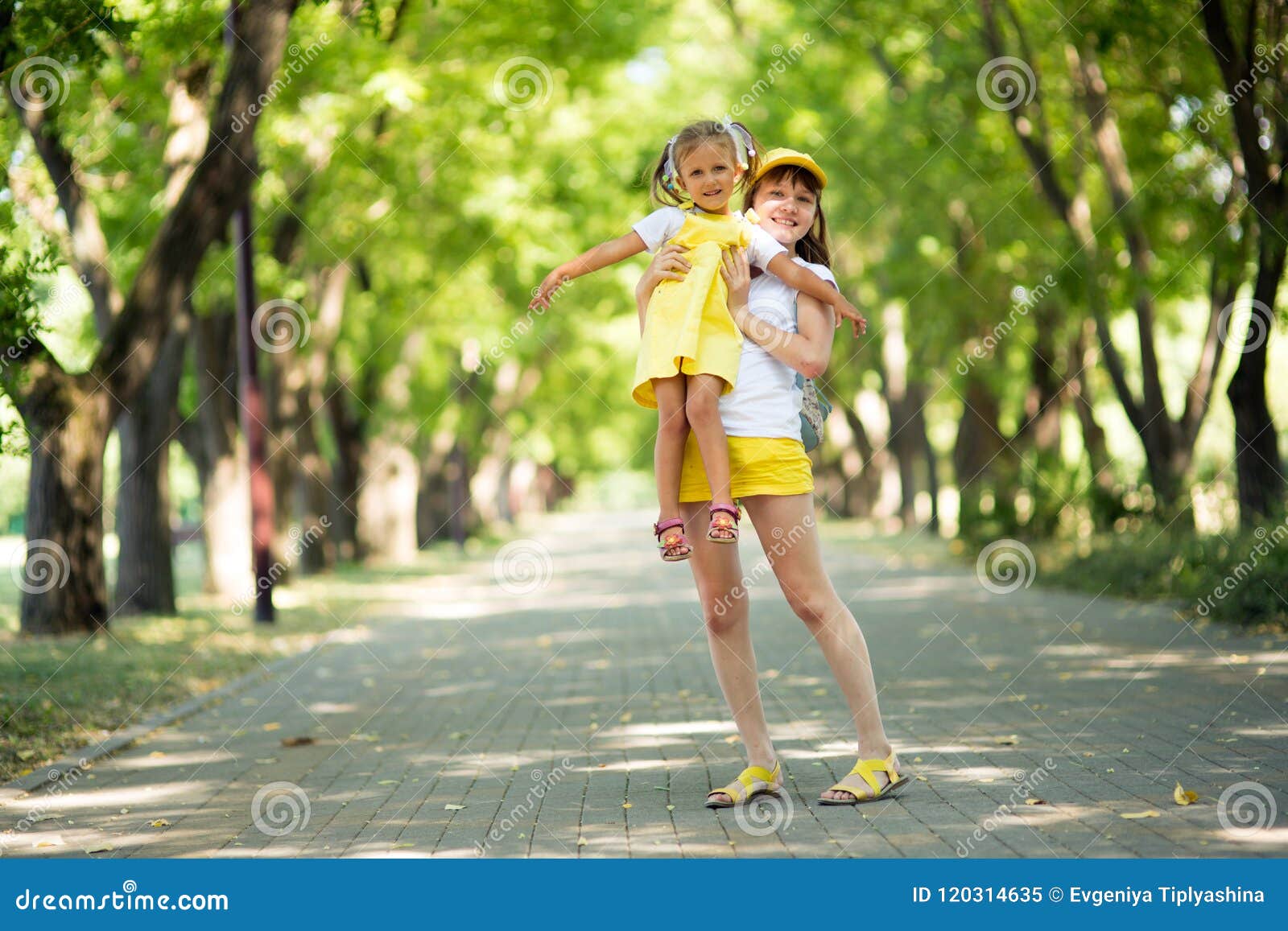 Two girls in the park stock image. Image of happy, grass - 120314635
