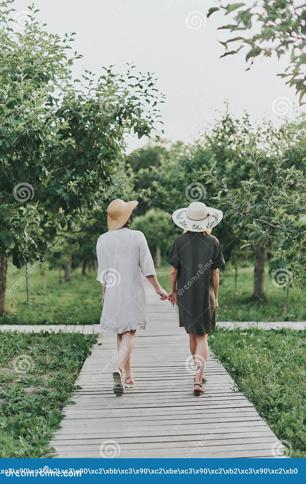 Two Girls Walk In The Park Holding Hands Stock Image | CartoonDealer ...