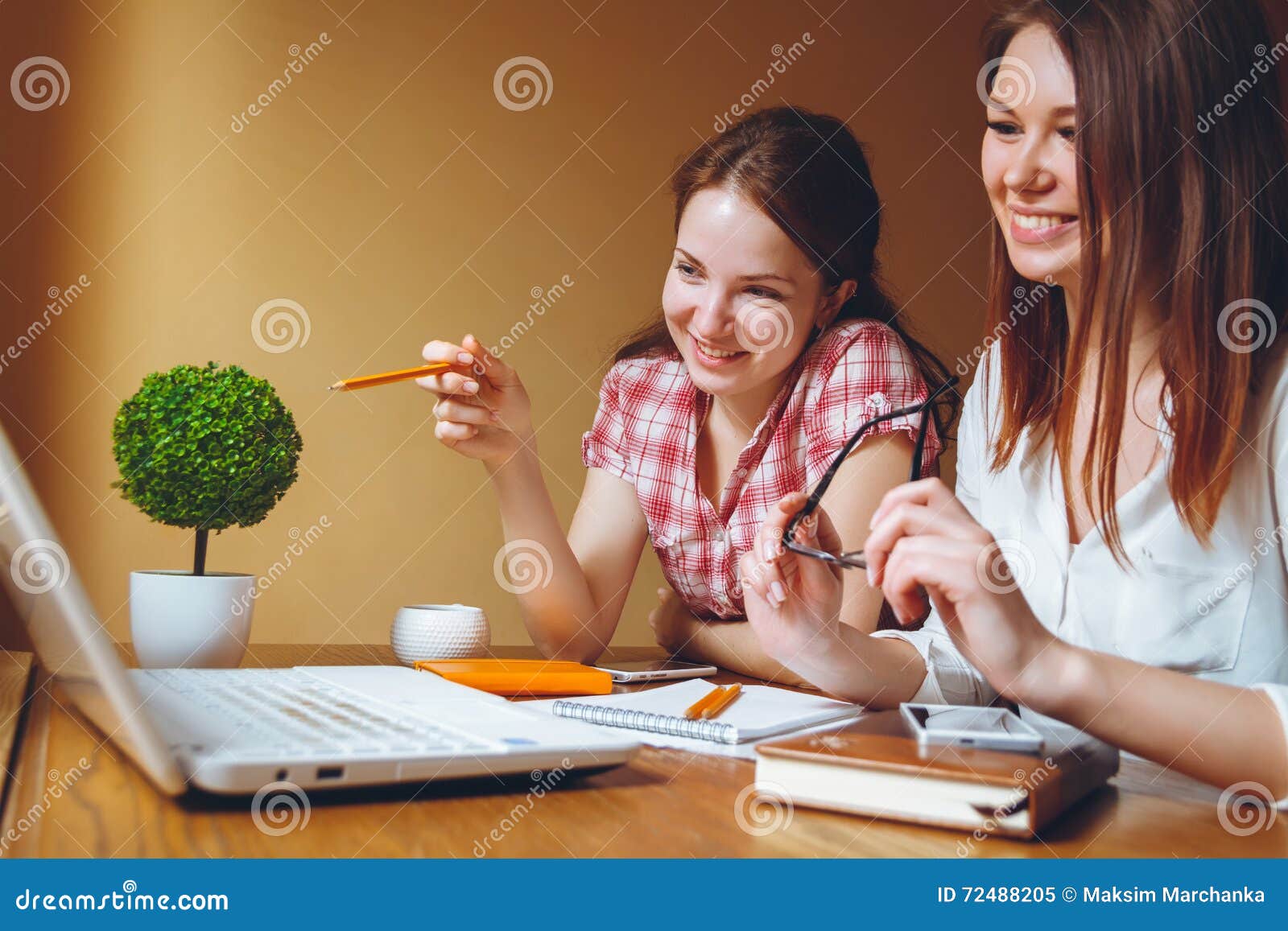 Two Girls Work at Office on Computer and Tablet Stock Image - Image of ...