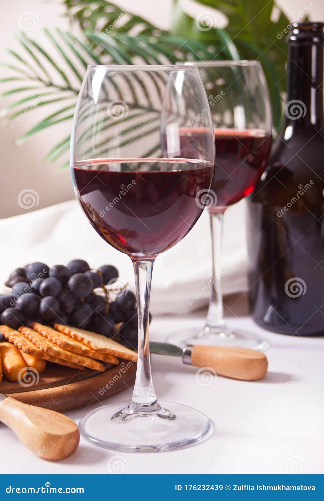 Two Glass of Red Wine and Plate with Assorted Cheese, Fruit and Other ...