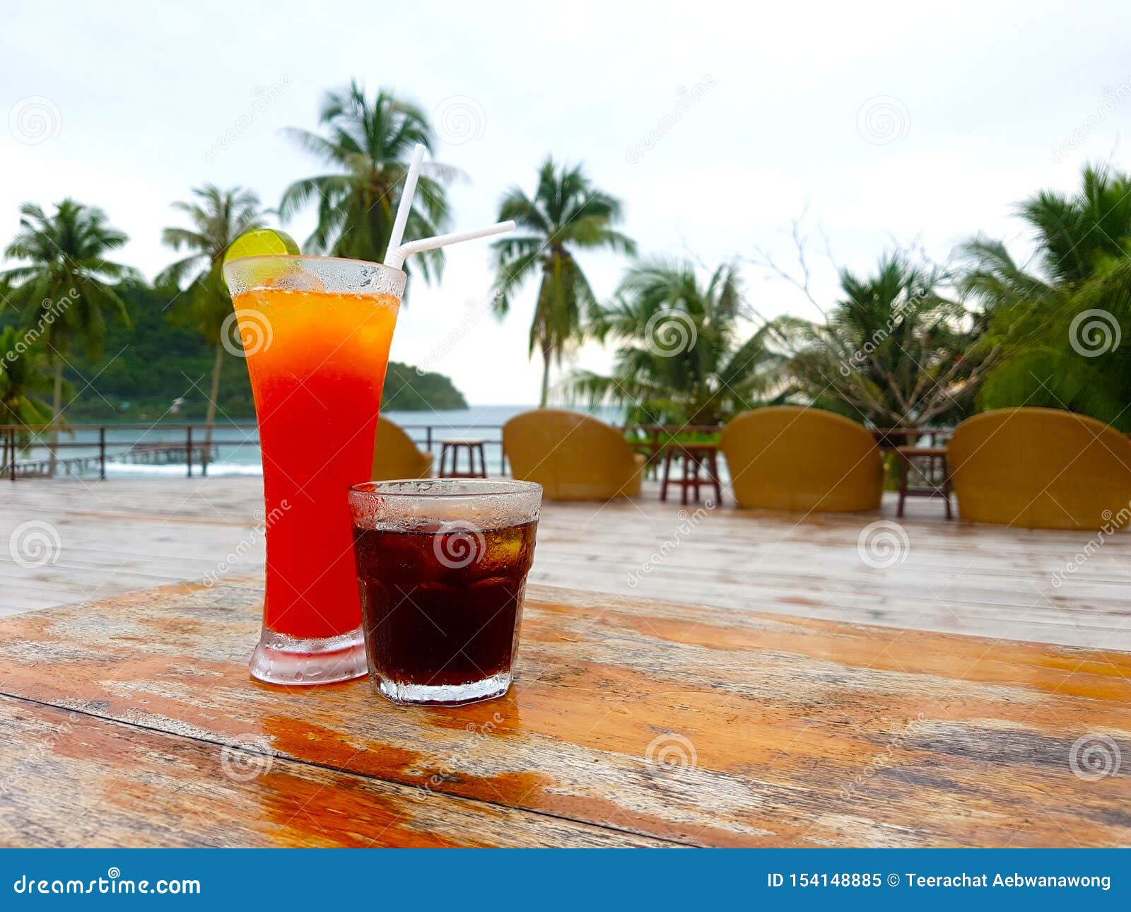 Two Glasses of the Cold Cola and Lemon Tea on Sea Beach Background ...