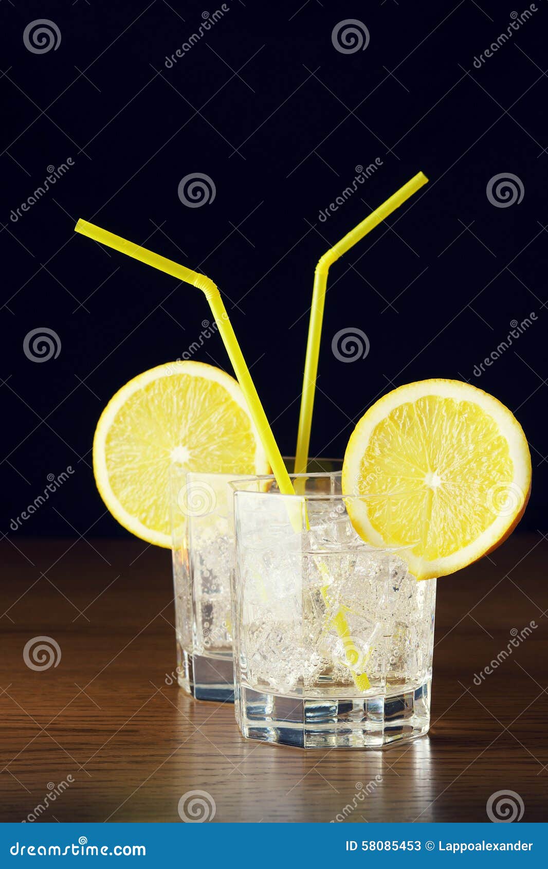 Two glasses of drink stock image. Image of bubbles, citrus - 58085453