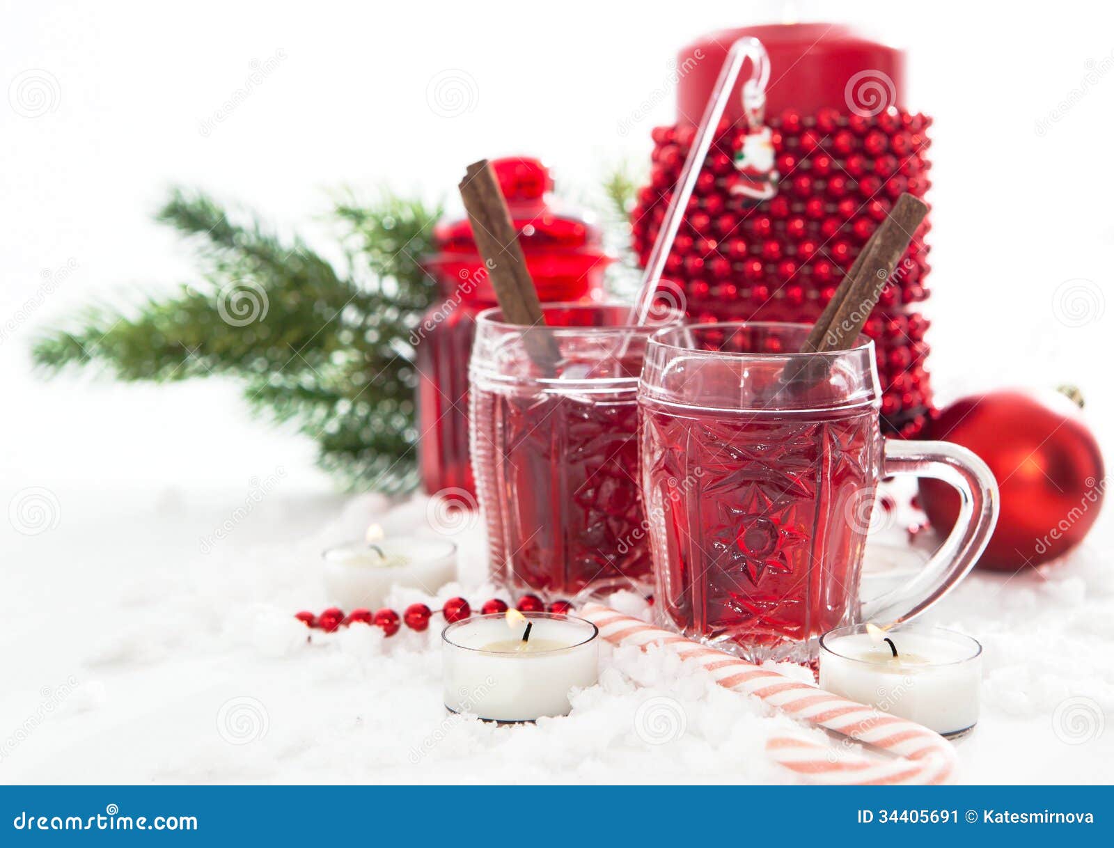 Two Glasses of Mulled Wine and Candle with Christmas Decorations Stock ...