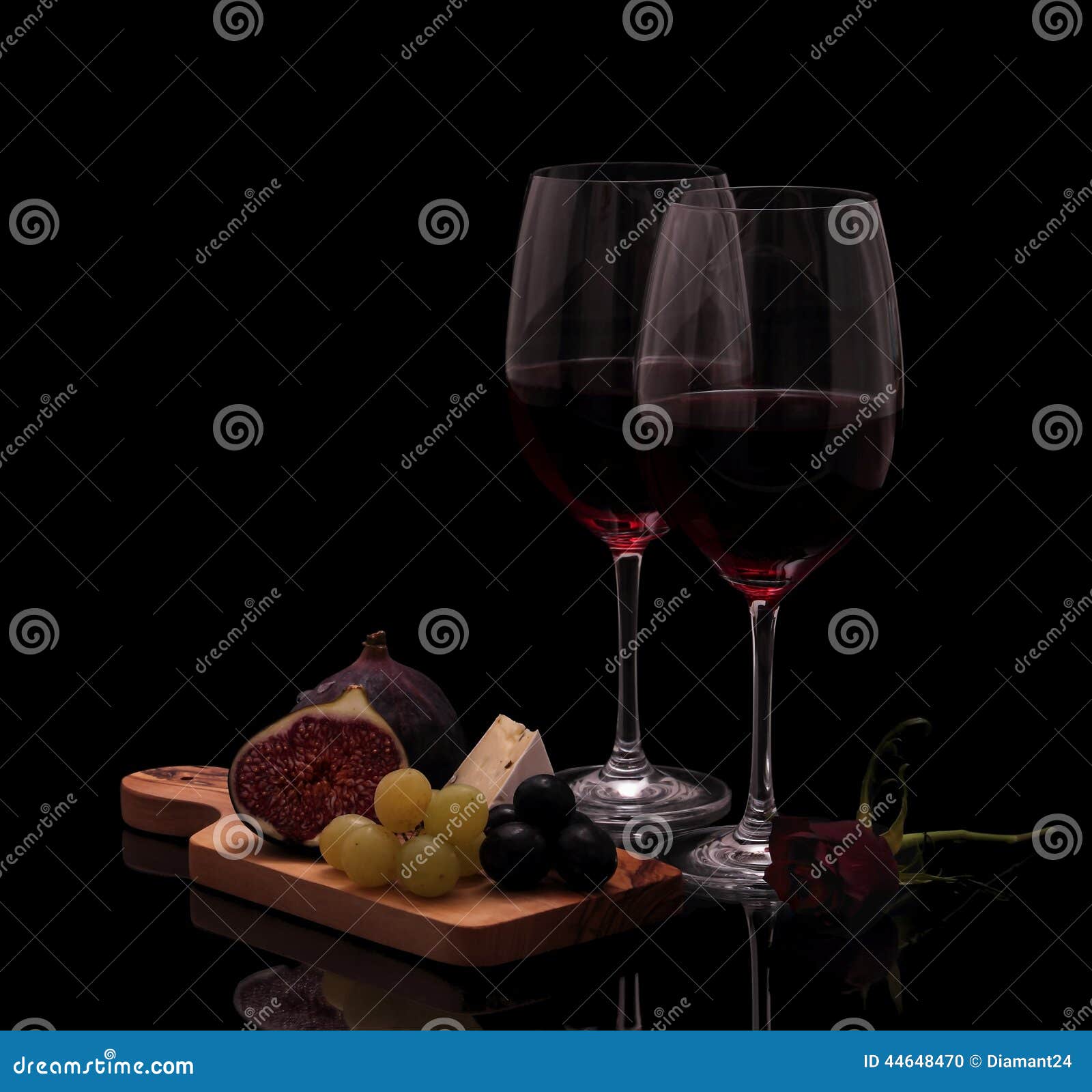 Two Glasses Red Wine with Cheese, Rose, Figs and Grapes Stock Photo ...