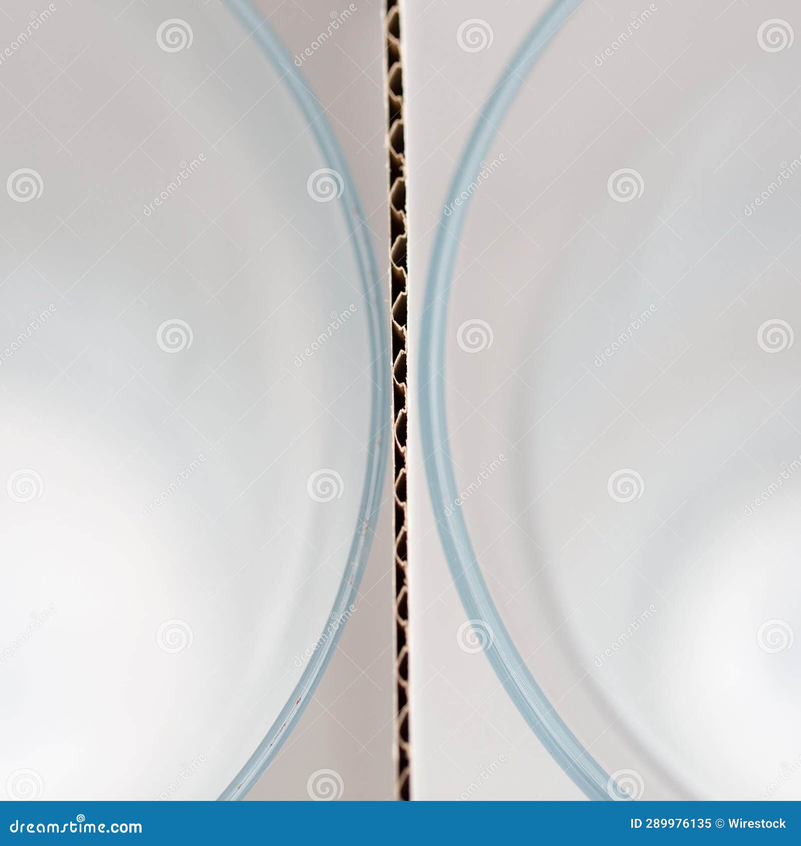 Two Glasses are Separated by a Corrugated Cardboard. Stock Image ...