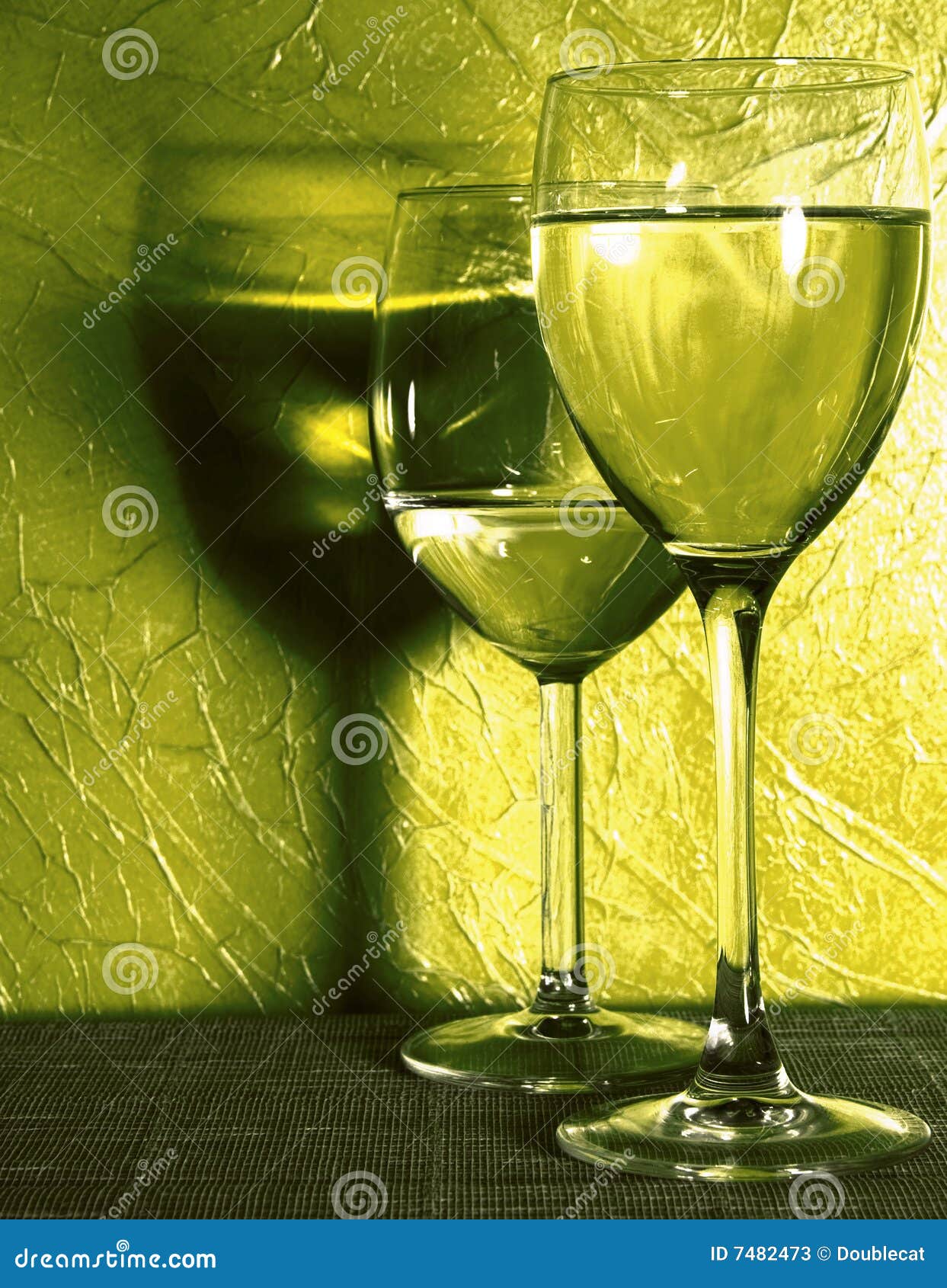Two glasses and a shadow stock image. Image of clear, green - 7482473