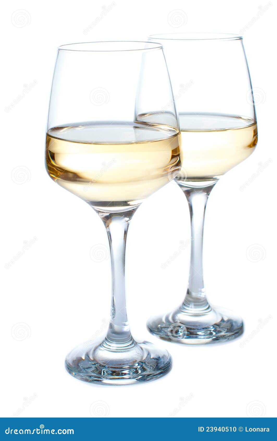Two glasses of white wine stock photo. Image of stemware - 23940510